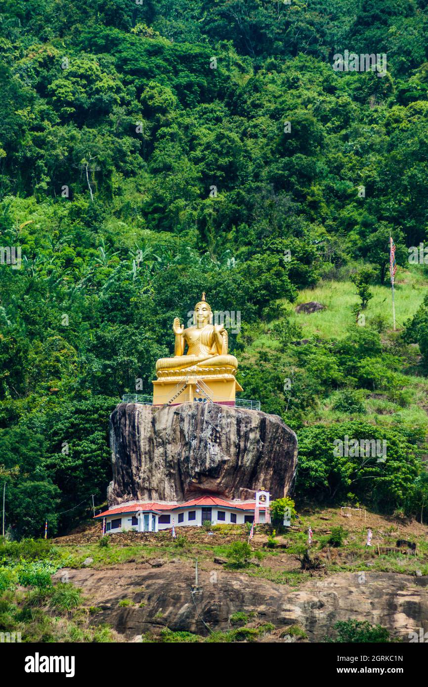 Buddha statue at a hill slope near Aluvihare Rock Temple, Sri Lanka ...