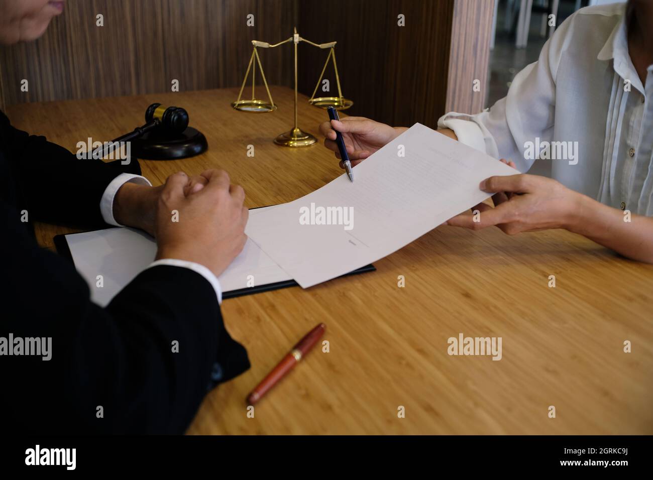 Asking for signature hi-res stock photography and images - Alamy