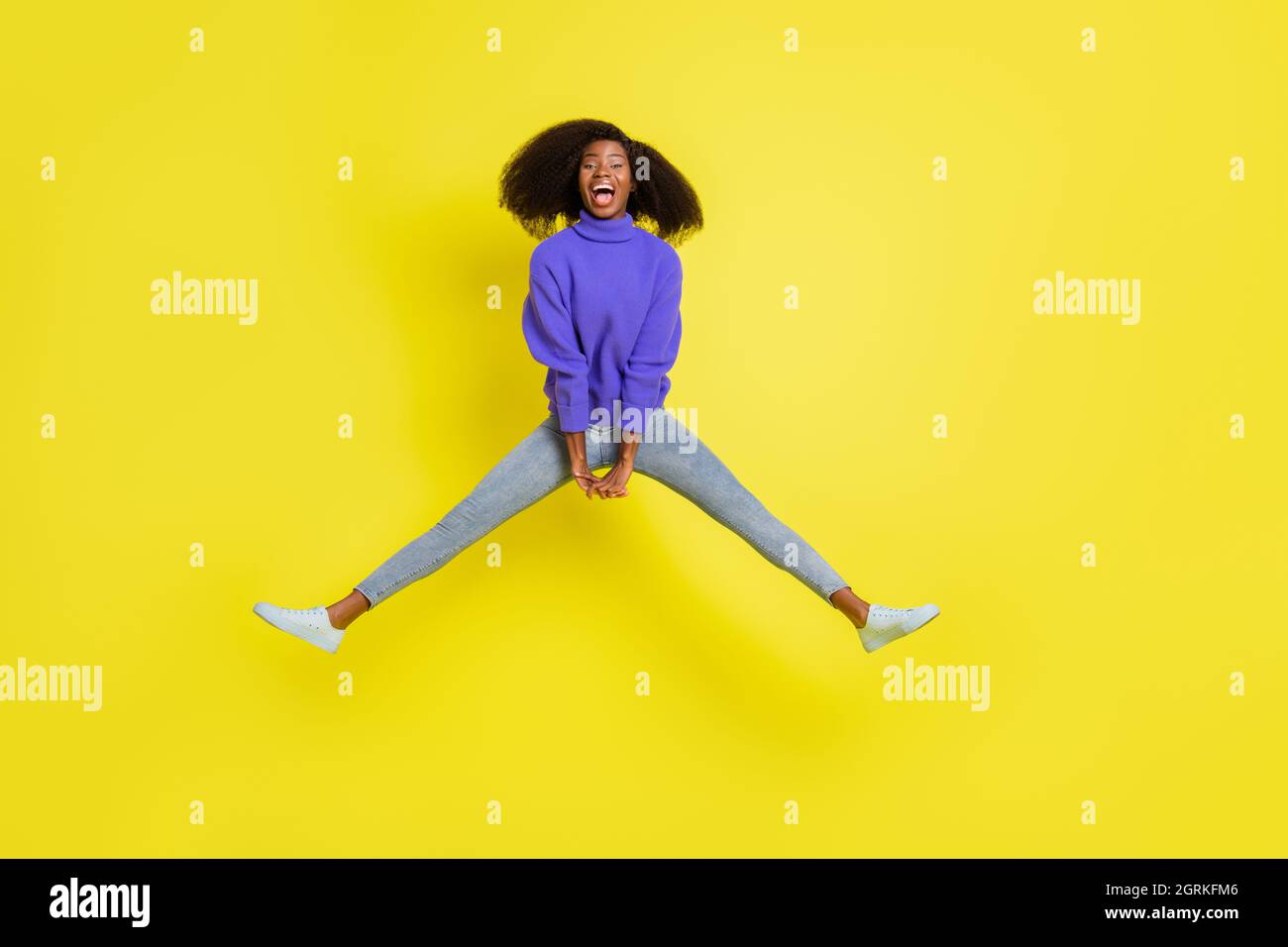 Full size photo of cheerful dark skin person jumping open mouth shout ...