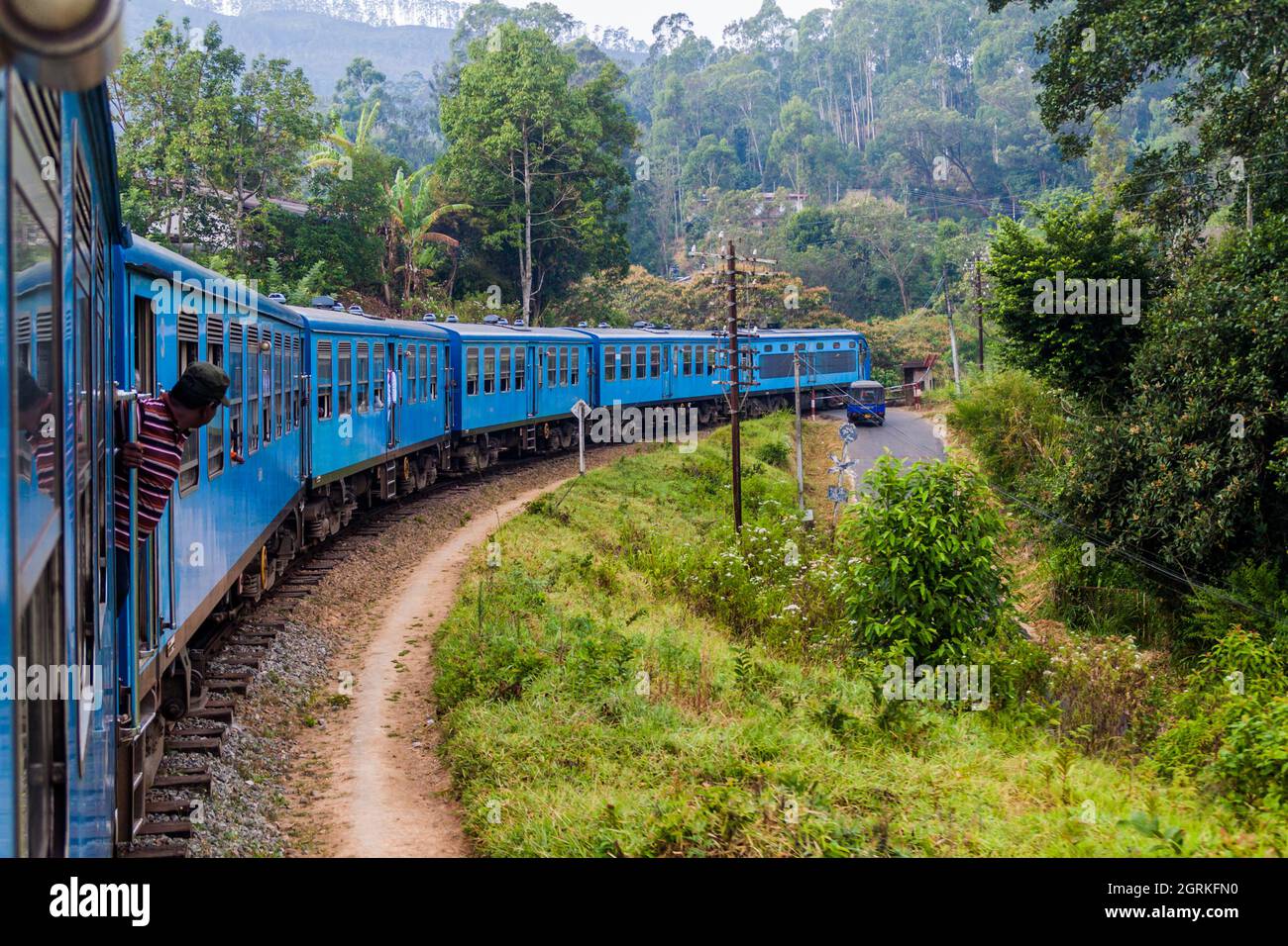 BANDARAWELA, SRI LANKA - JULY 15, 2016: Train rides through mountains ...