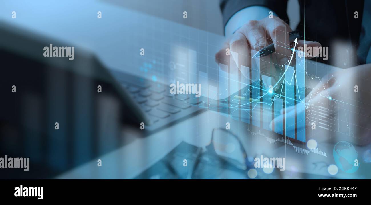 Businessman working with modern computer calculator virtual dashboard ...