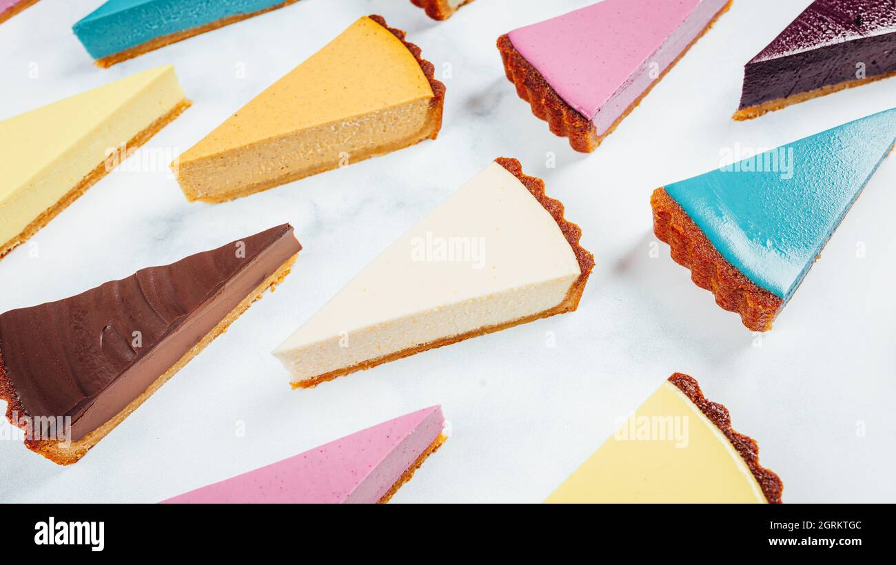 Vegan cakes cut in a triangle shape on a white background Stock Photo ...