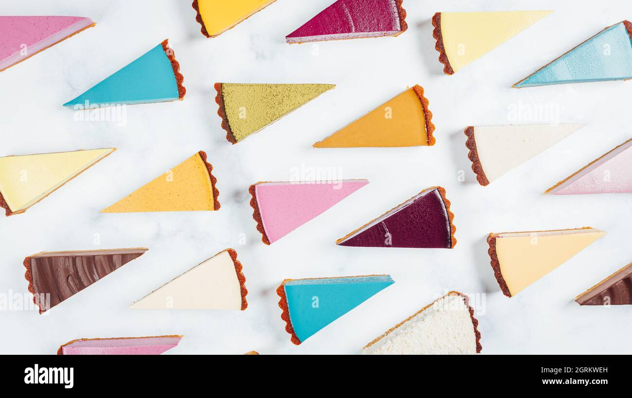 Vegan cakes cut in a triangle shape on a white background Stock Photo ...