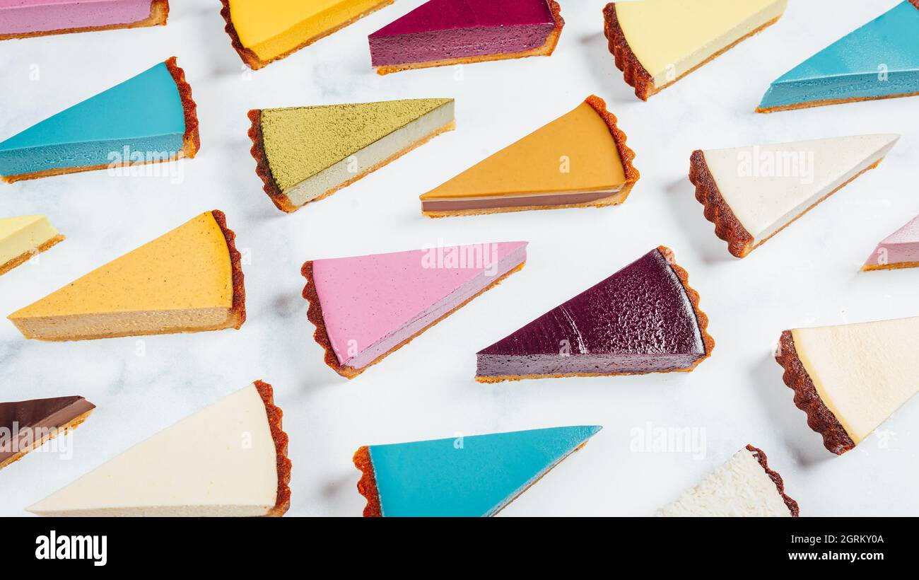 Vegan cakes cut in a triangle shape on a white background Stock Photo ...