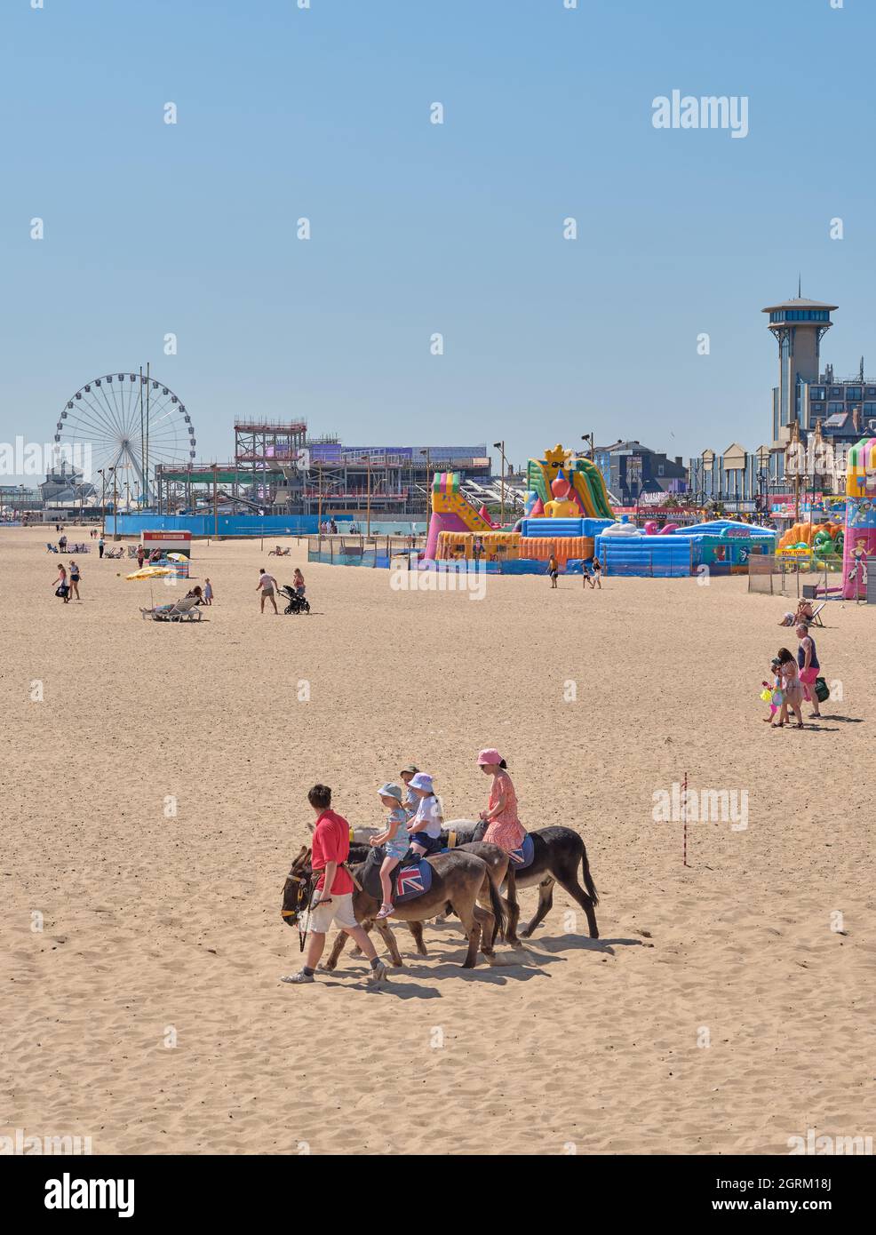 A beach Donkey ride in Great Yarmouth seaside resort town and pleasure ...