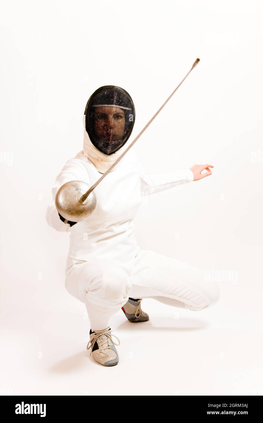 Full Length Of Female Fencer Against White Background Stock Photo - Alamy