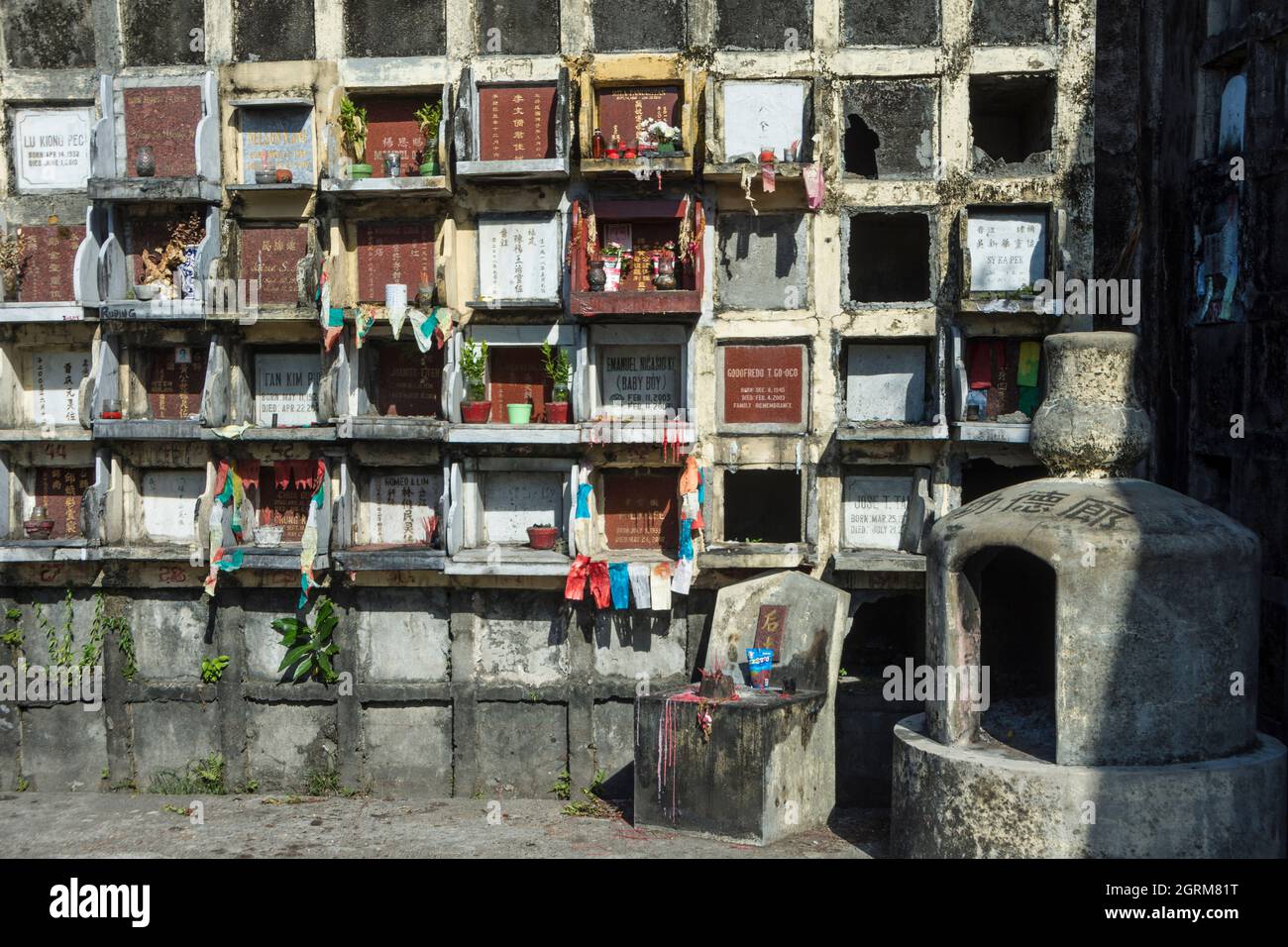 Wall of graves in the Manila Chinese Cemetery, Manila, Philippines ...