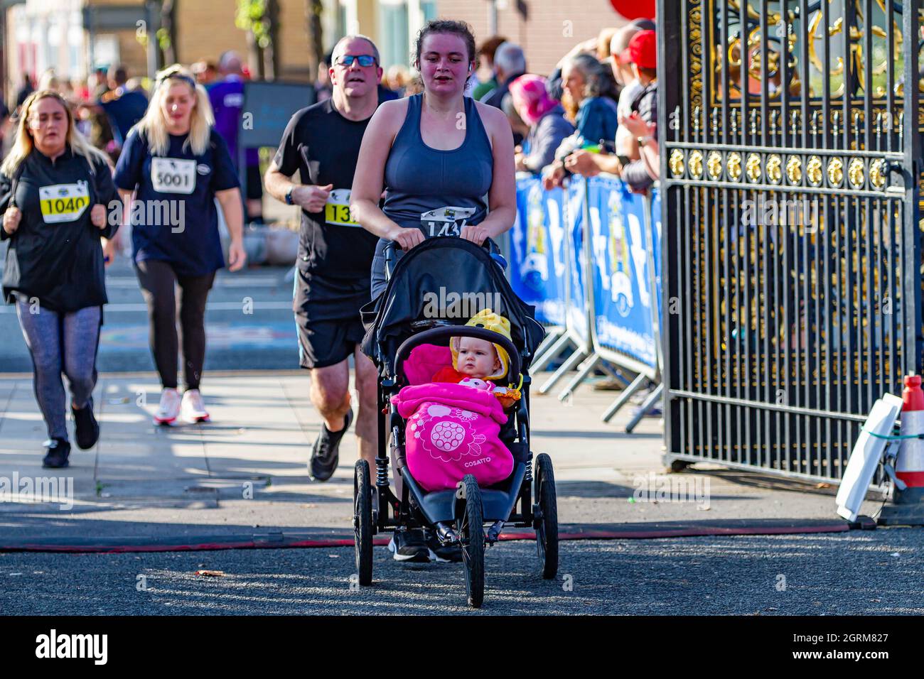 Child crossing the finish line hi-res stock photography and images - Alamy