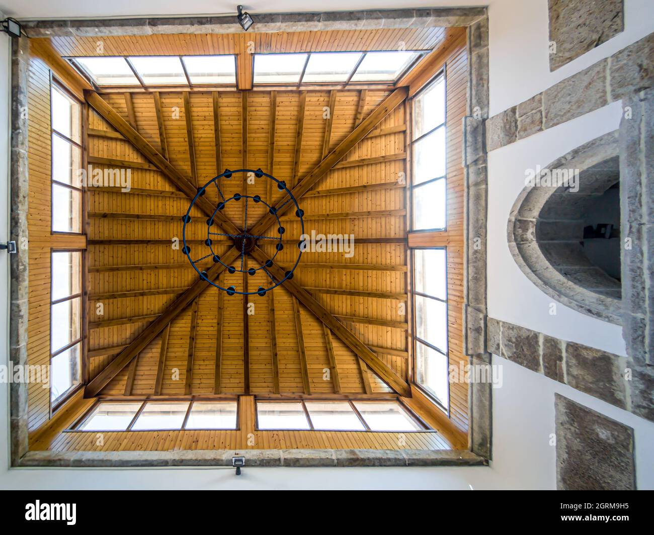 Interior view of a building with a wooden roof Stock Photo - Alamy