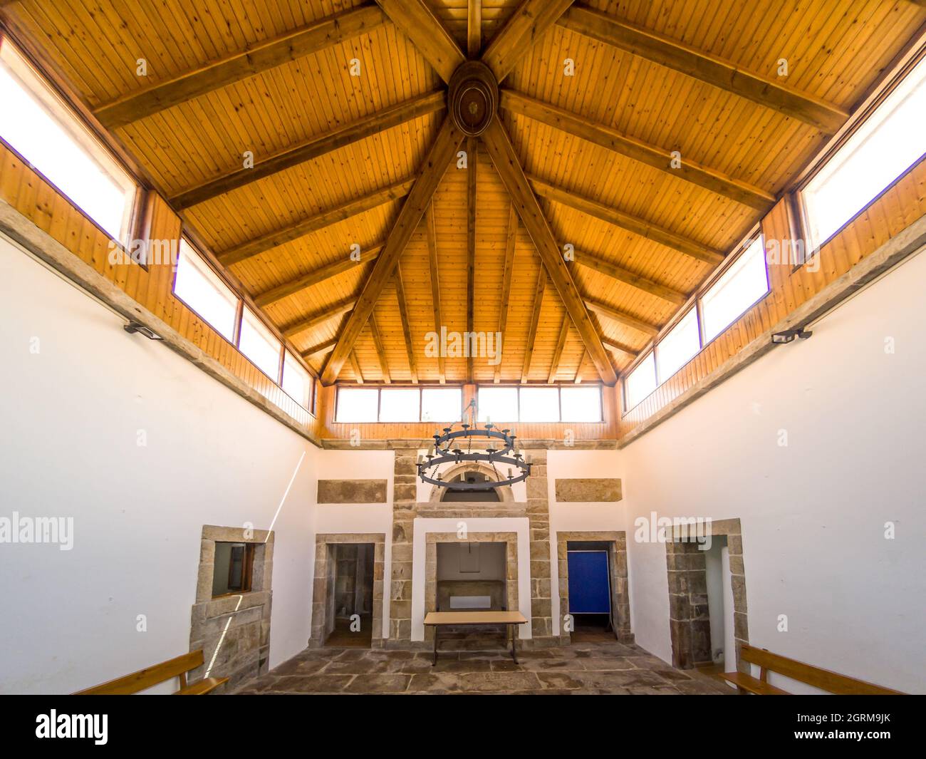 Interior view of a building with a wooden roof Stock Photo - Alamy