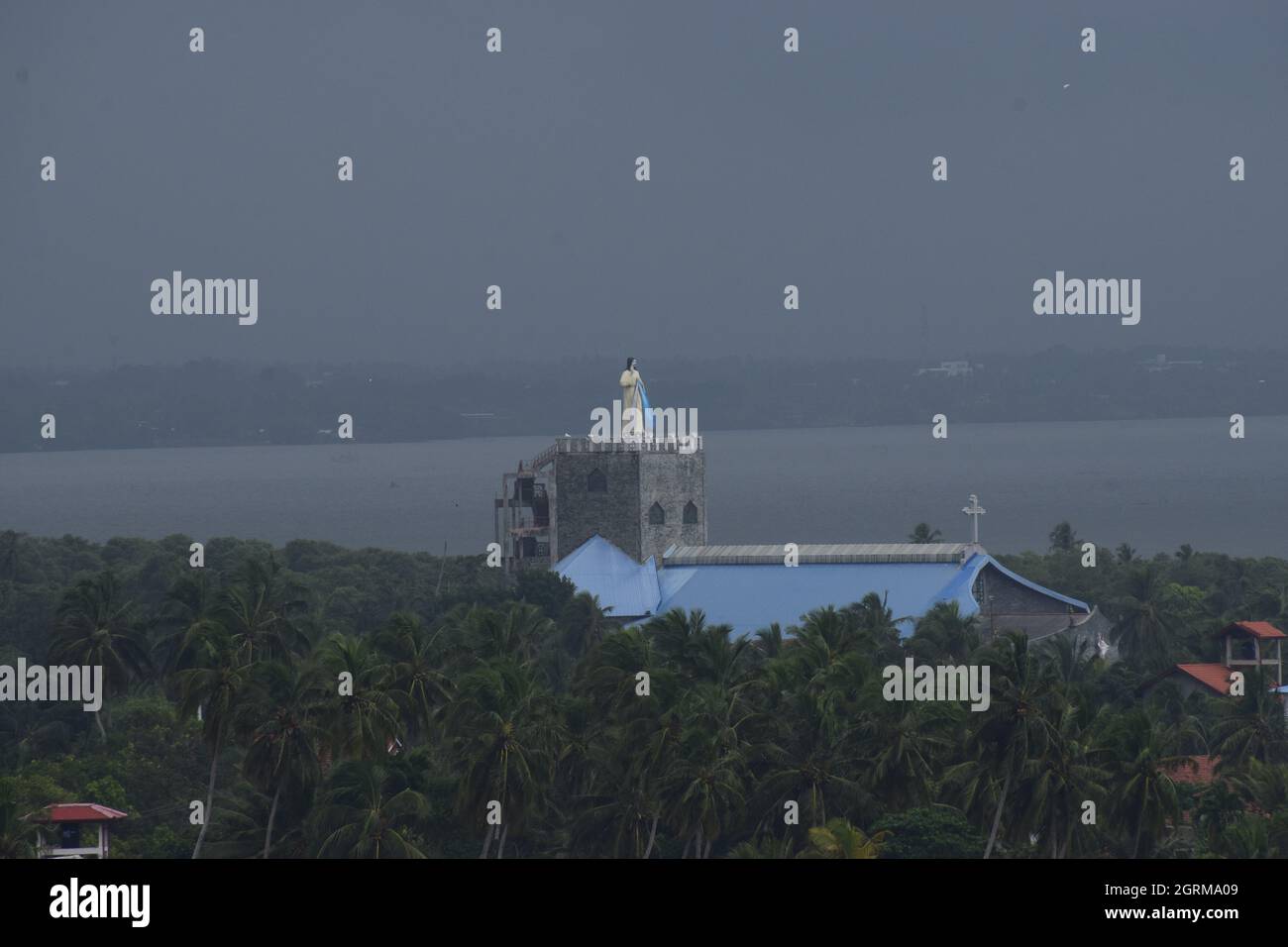 Church through the green nature Stock Photo - Alamy
