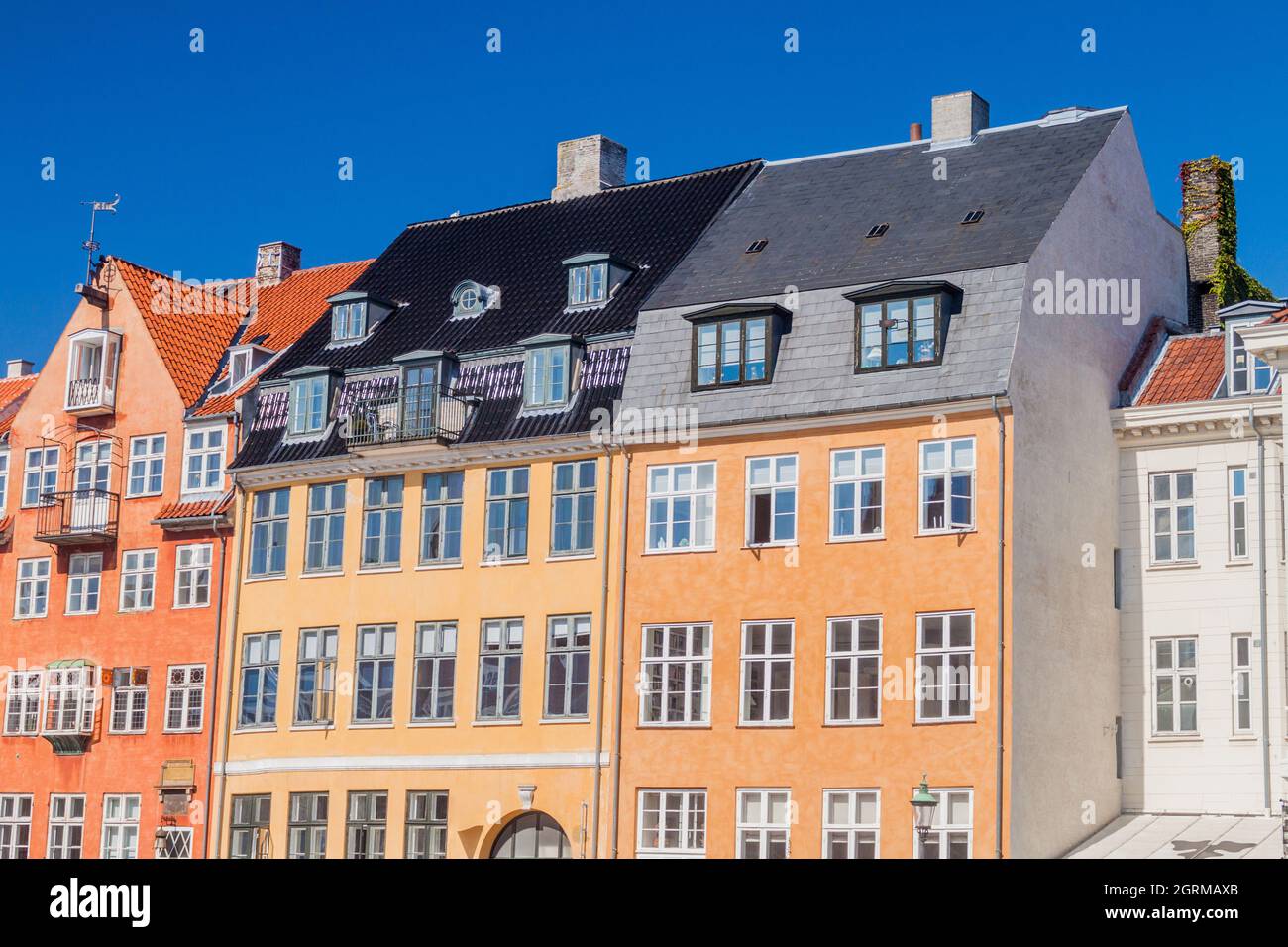 Colorful houses of Nyhavn district in Copenhagen, Denmark Stock Photo ...