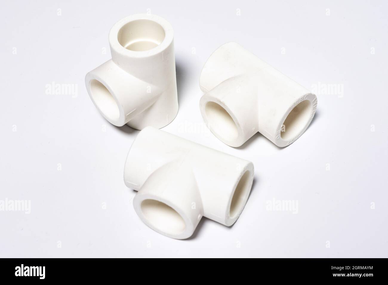 Pipe fitting set on a white background Stock Photo - Alamy