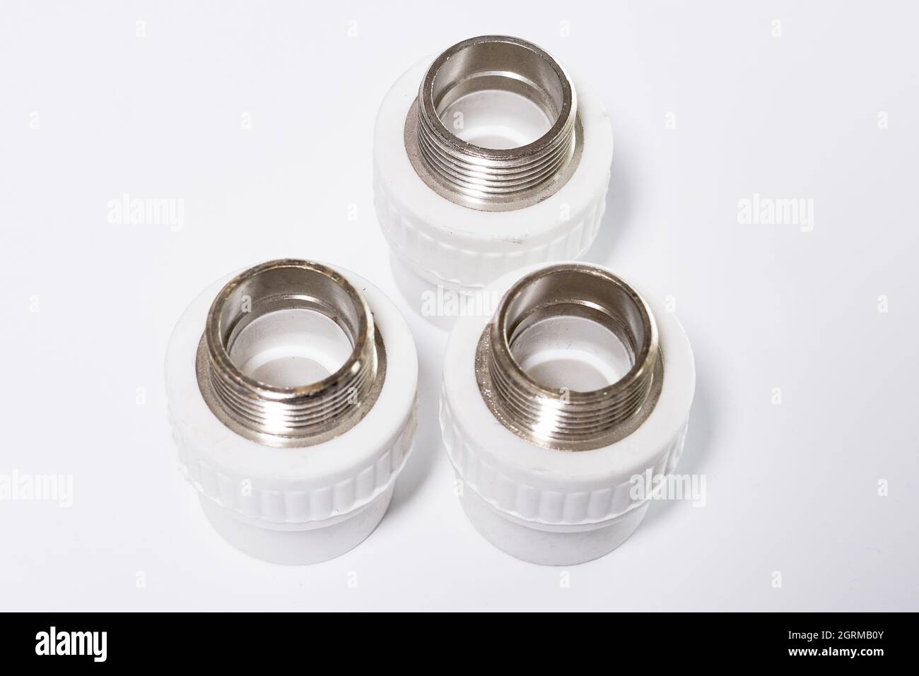 Pipe fitting set on a white background Stock Photo - Alamy