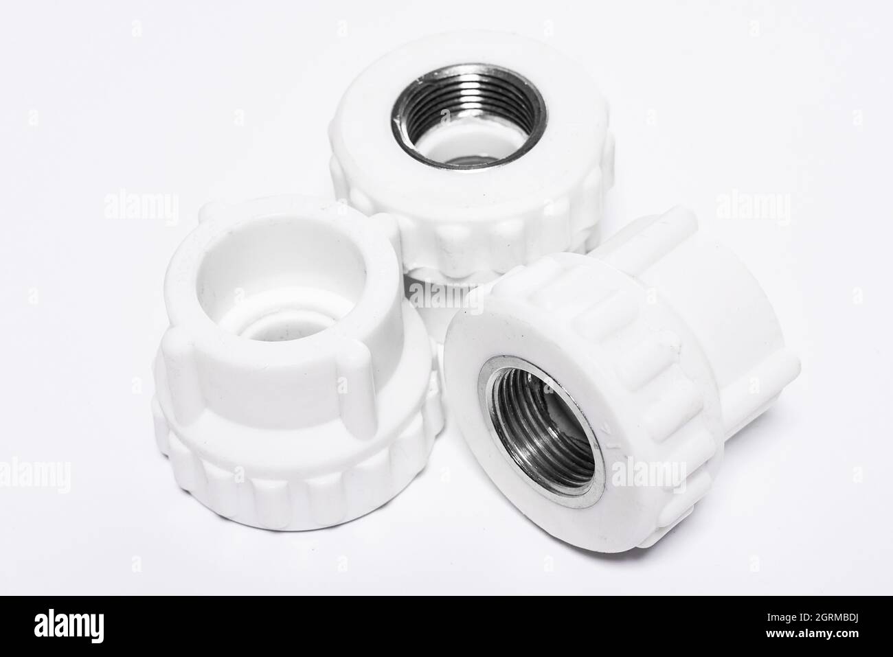Pipe fitting set on a white background Stock Photo - Alamy