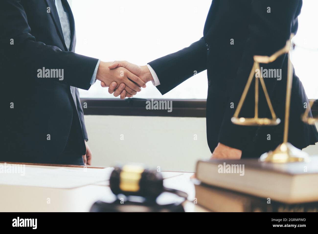 Judge lawyer shaking hands in hi-res stock photography and images - Alamy