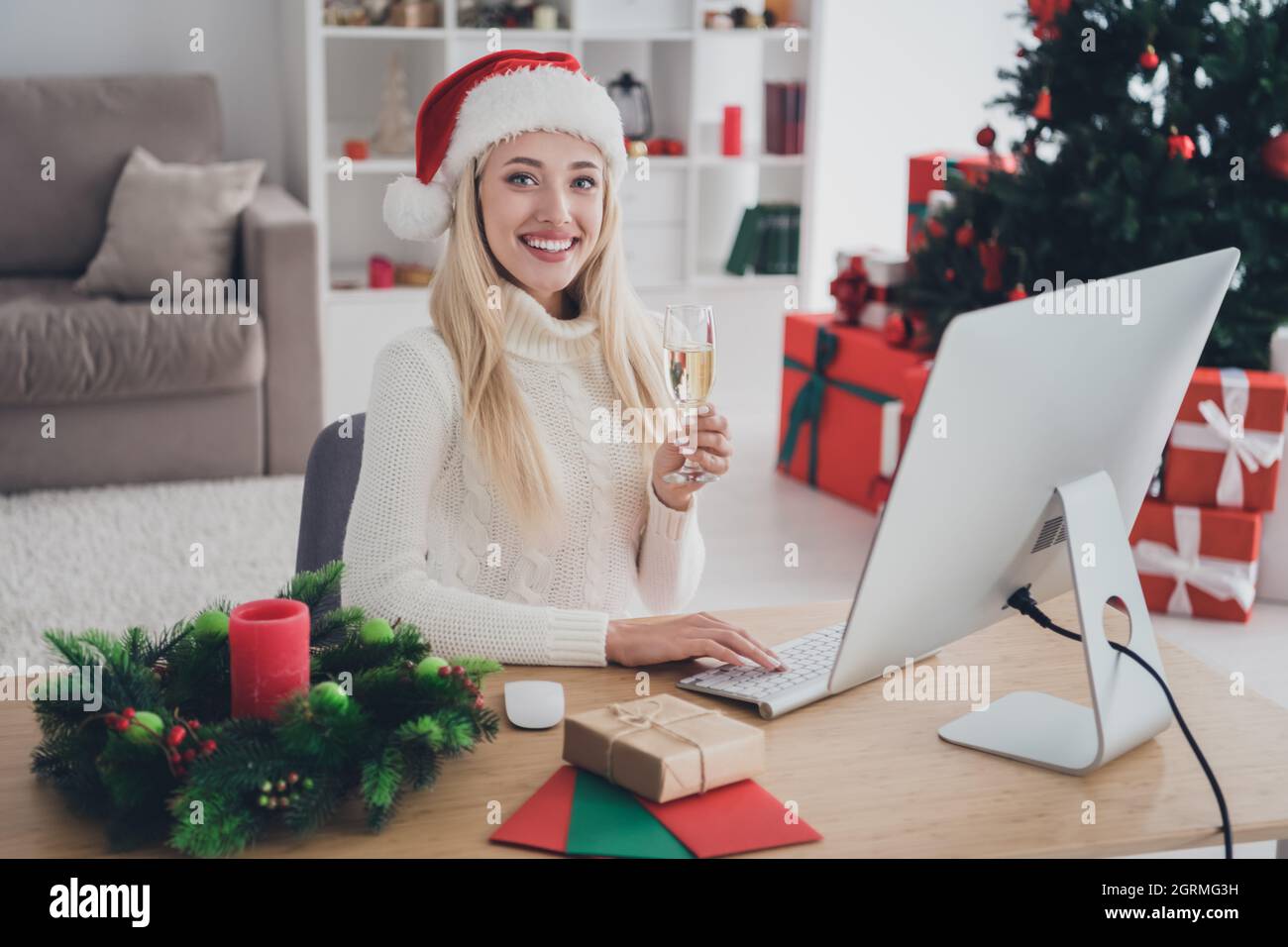 Photo of young girl happy positive smile use computer drink alcohol ...