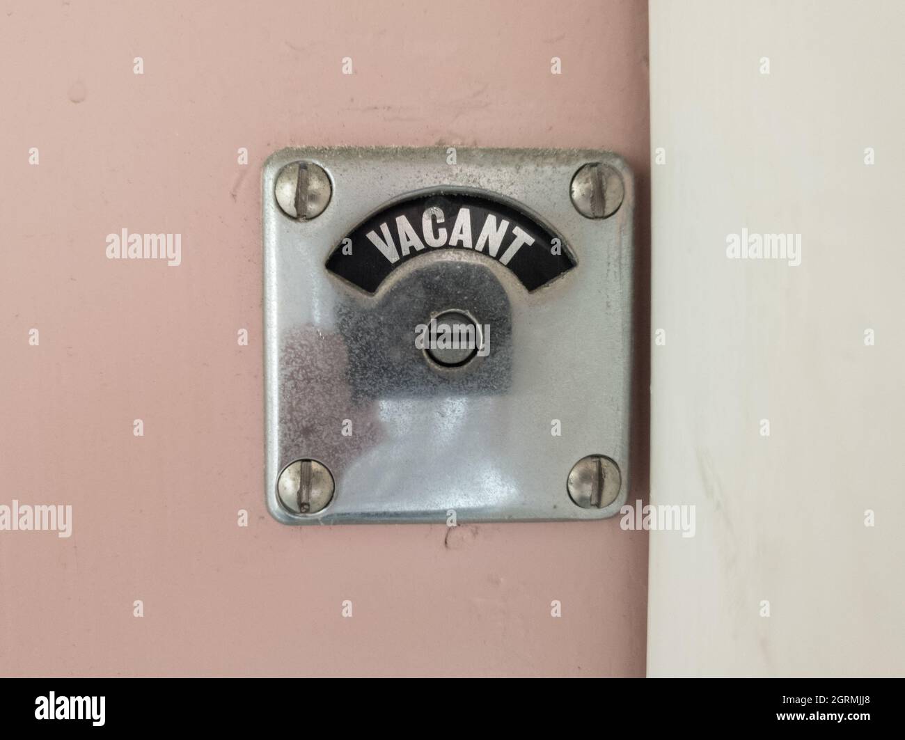 Vacant sign on toilet door hi-res stock photography and images - Alamy