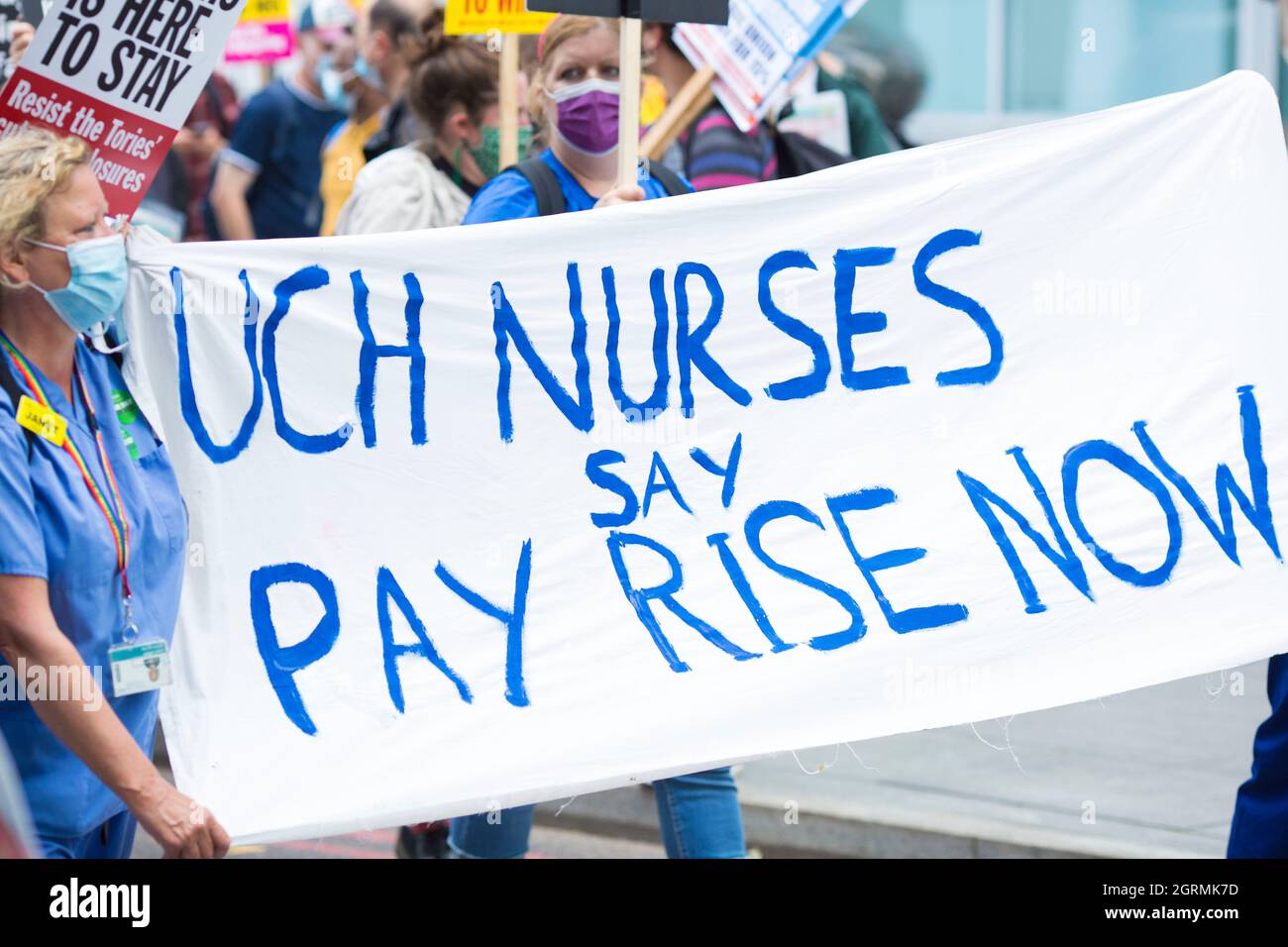 Participants gather and march during a protest demanding the government ...