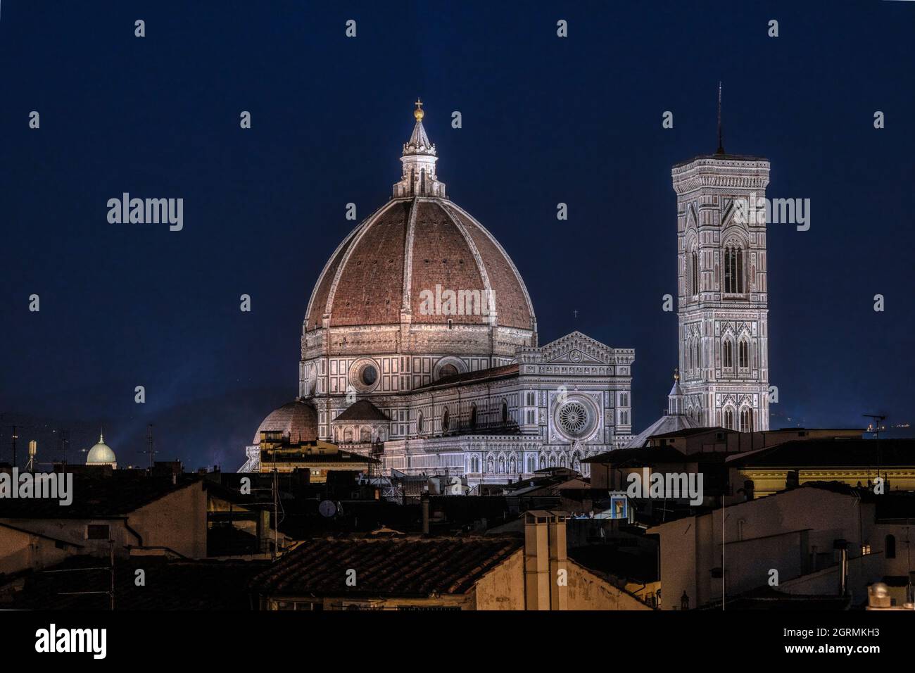 Night view of the Duomo and Giotto's bell tower from the rooftops of ...