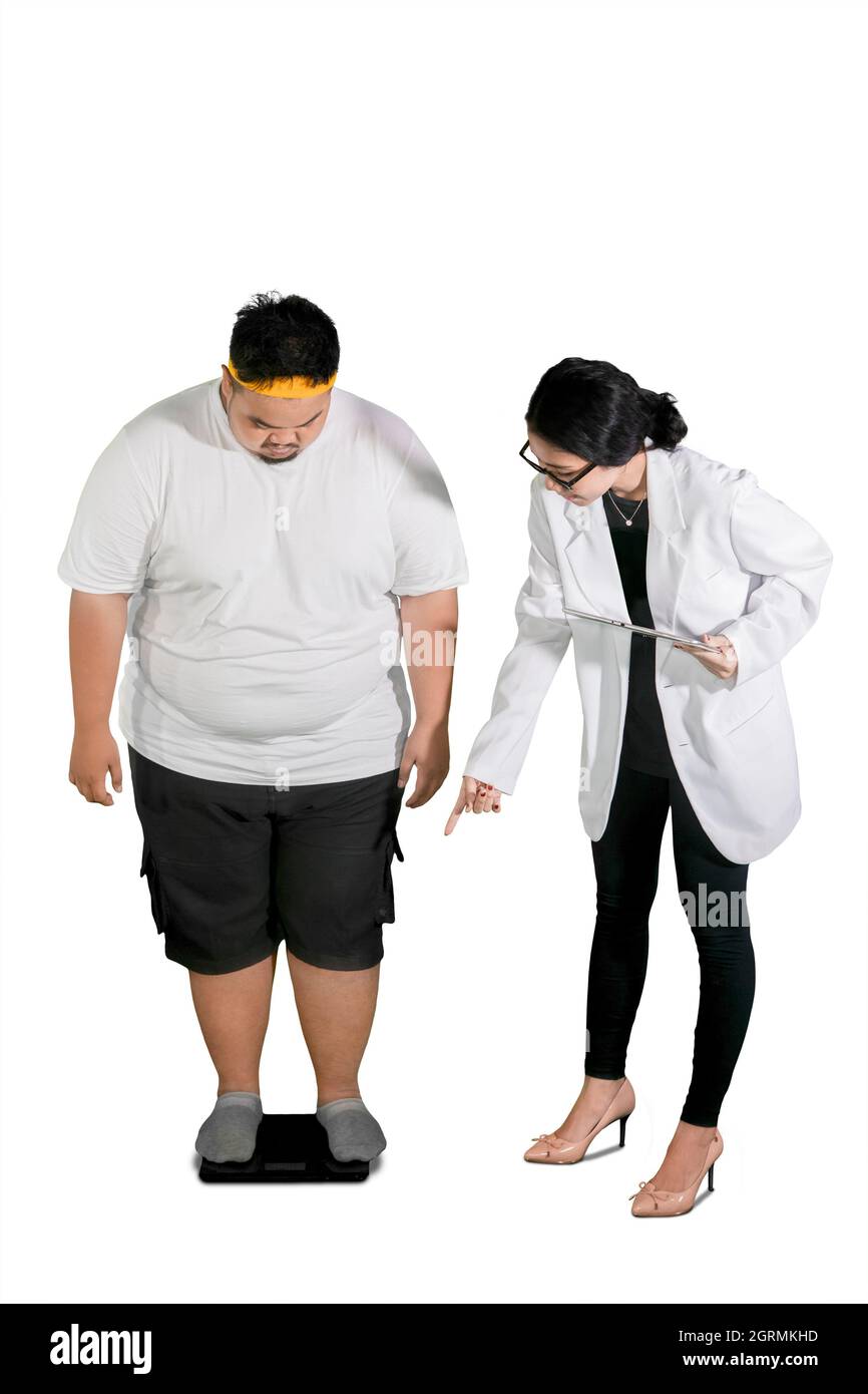 Fat man at the doctor hi-res stock photography and images - Alamy