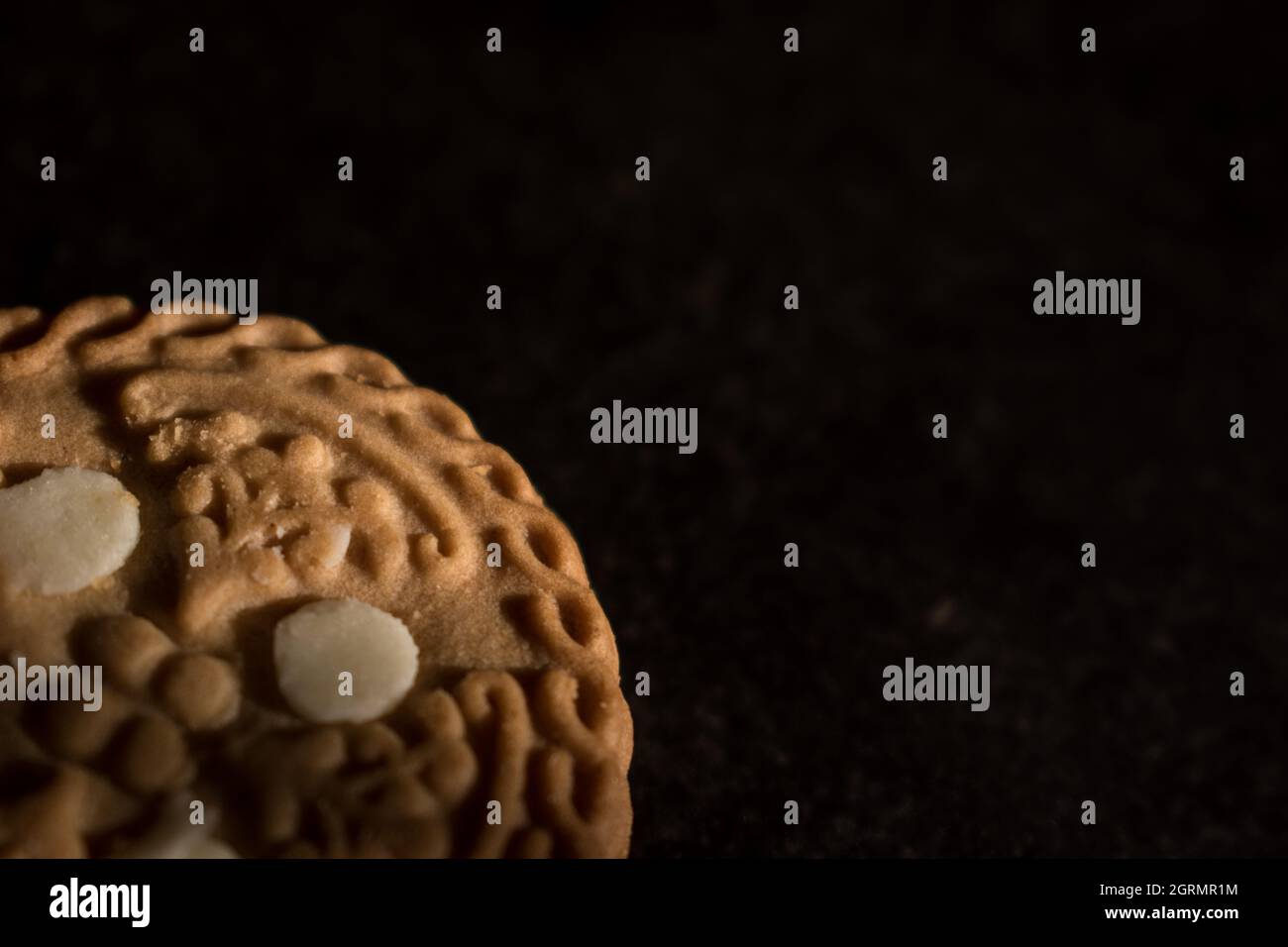 Close up of texture vanilla cookie on a black wooden table Stock Photo ...