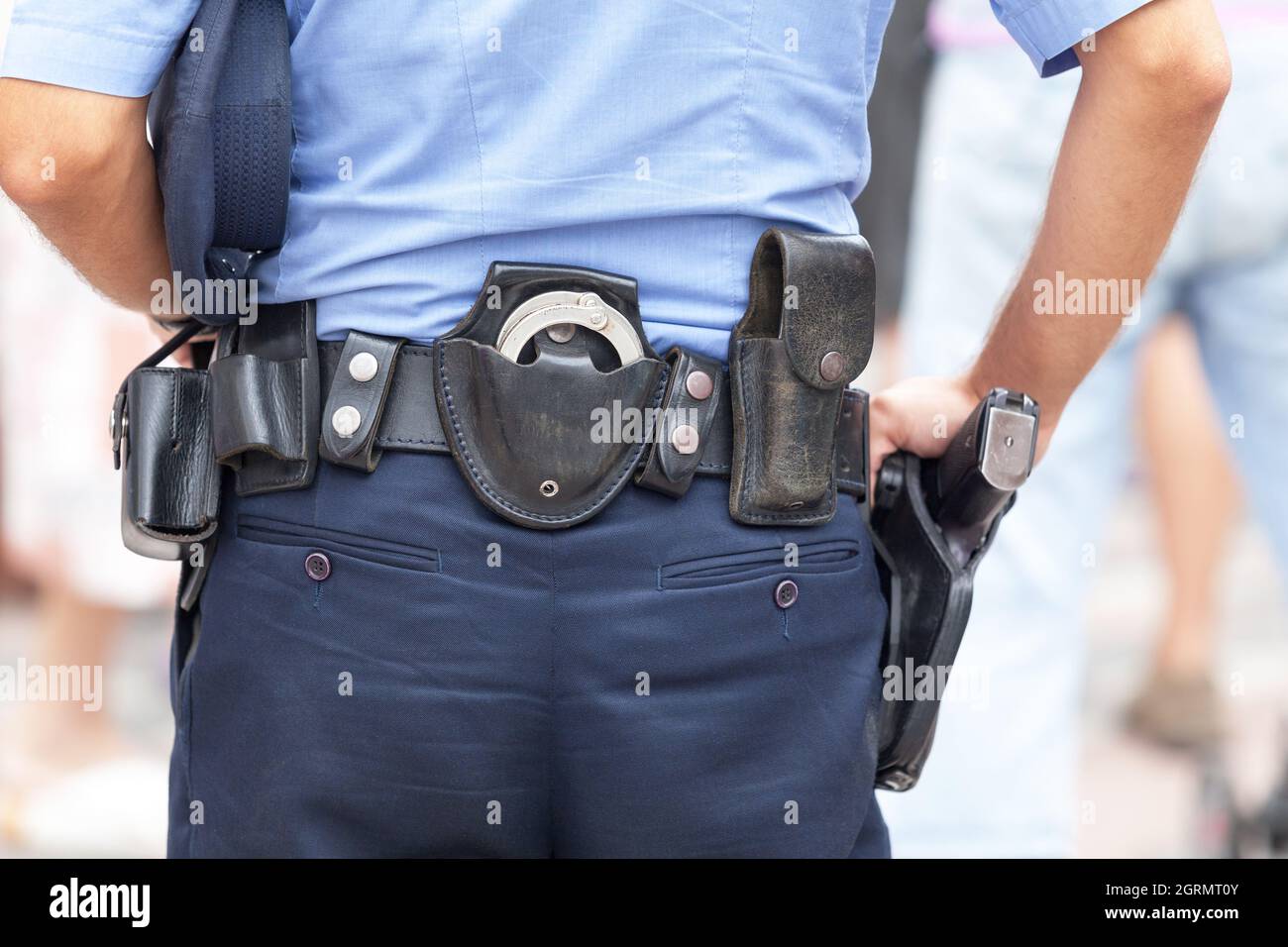 Police officer gun belt handcuffs hi-res stock photography and images ...
