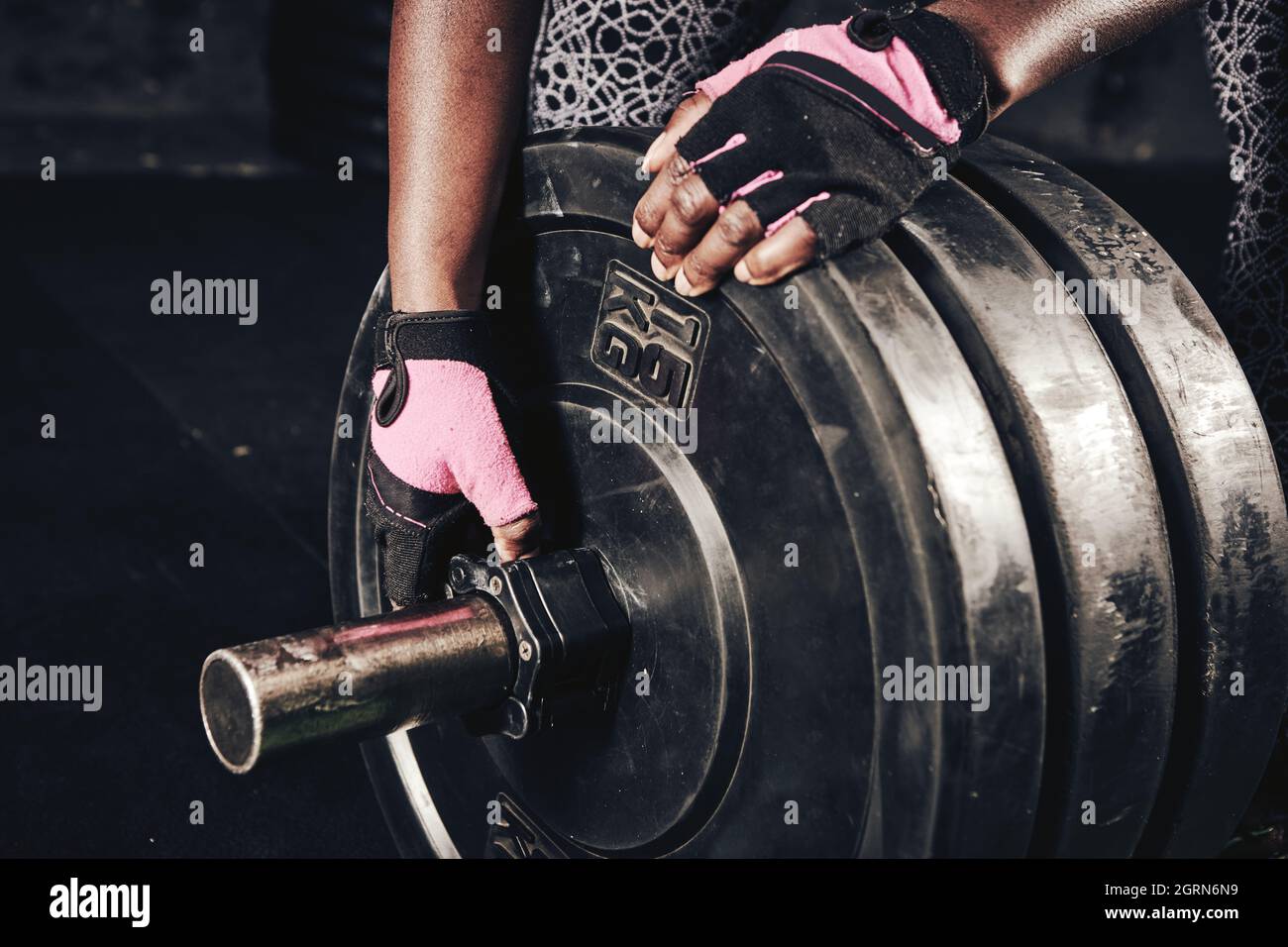 Hands on Free Weights Stock Photo - Alamy