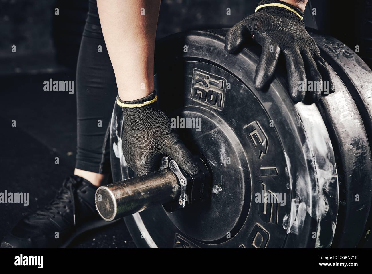 Hands on Free Weights Stock Photo - Alamy