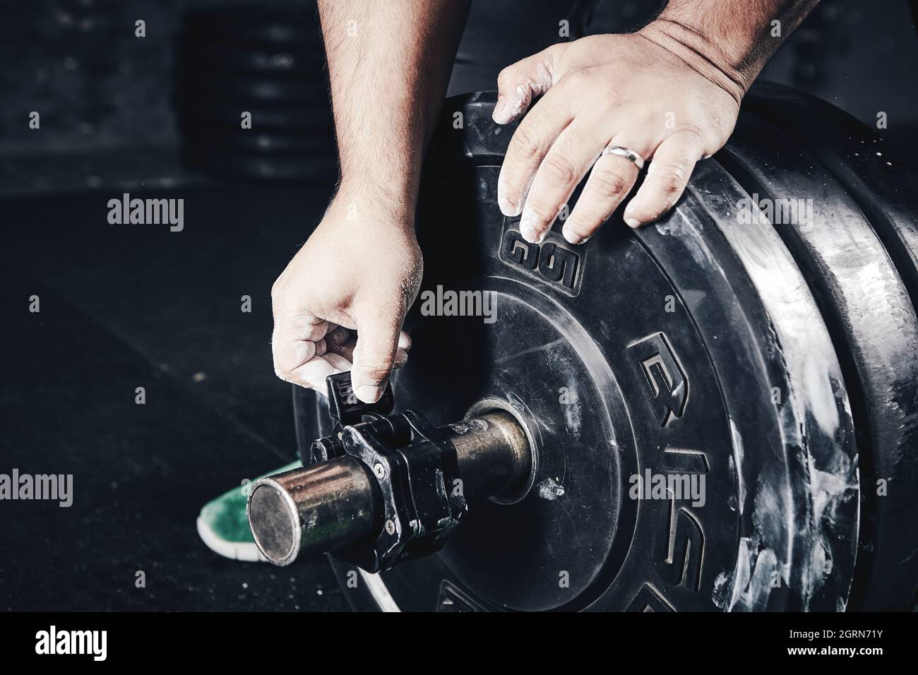 Hands on Free Weights Stock Photo - Alamy