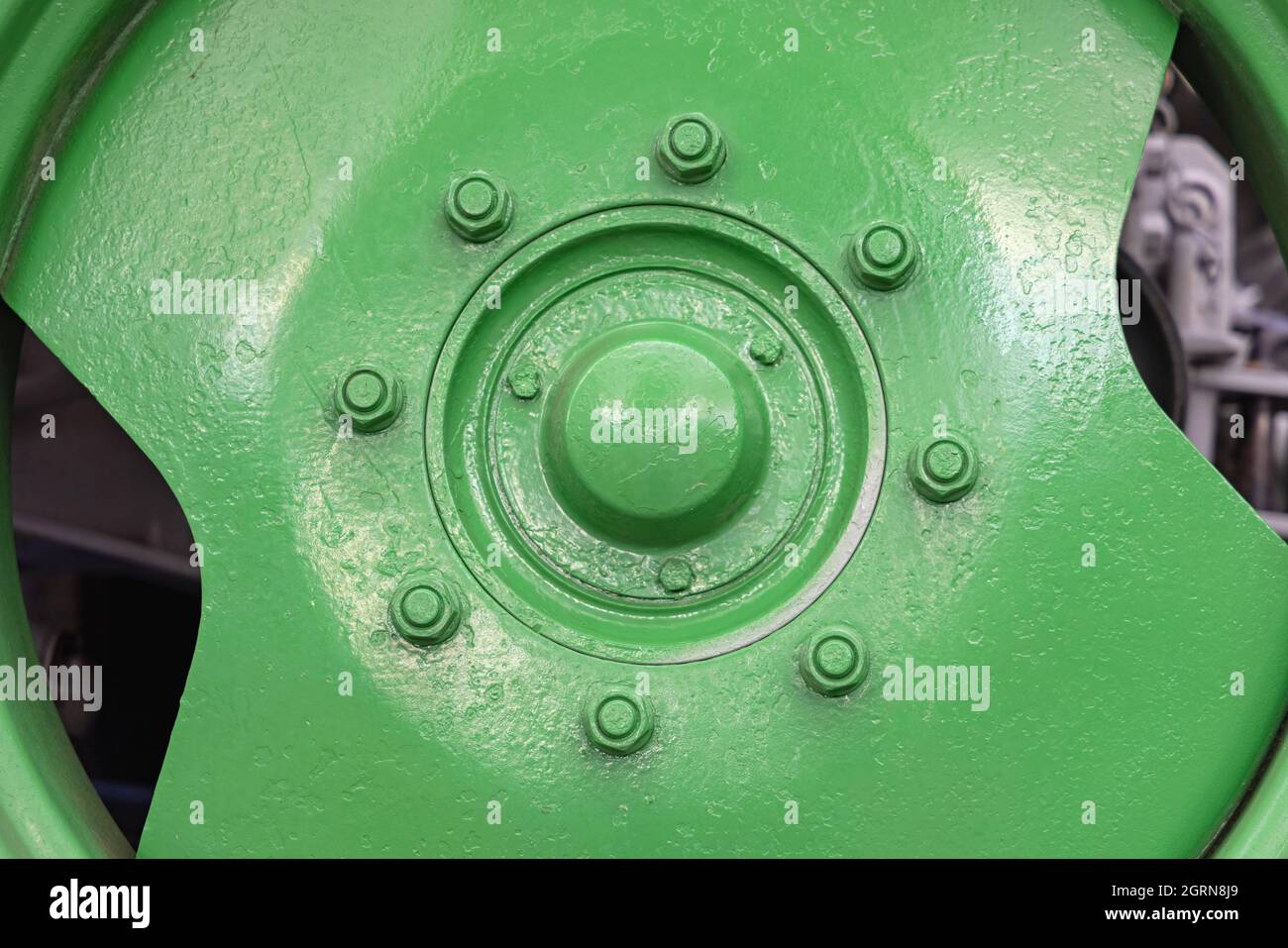 Big Wheel Rim at Green Agriculture Tractor Stock Photo - Alamy