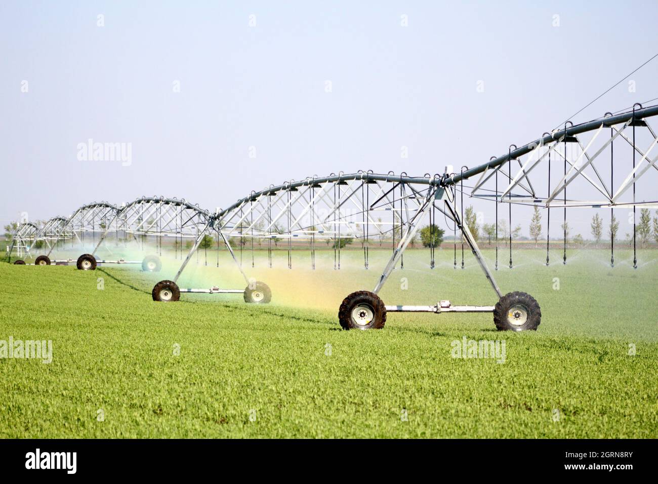 Irrigation system in field Stock Photo - Alamy