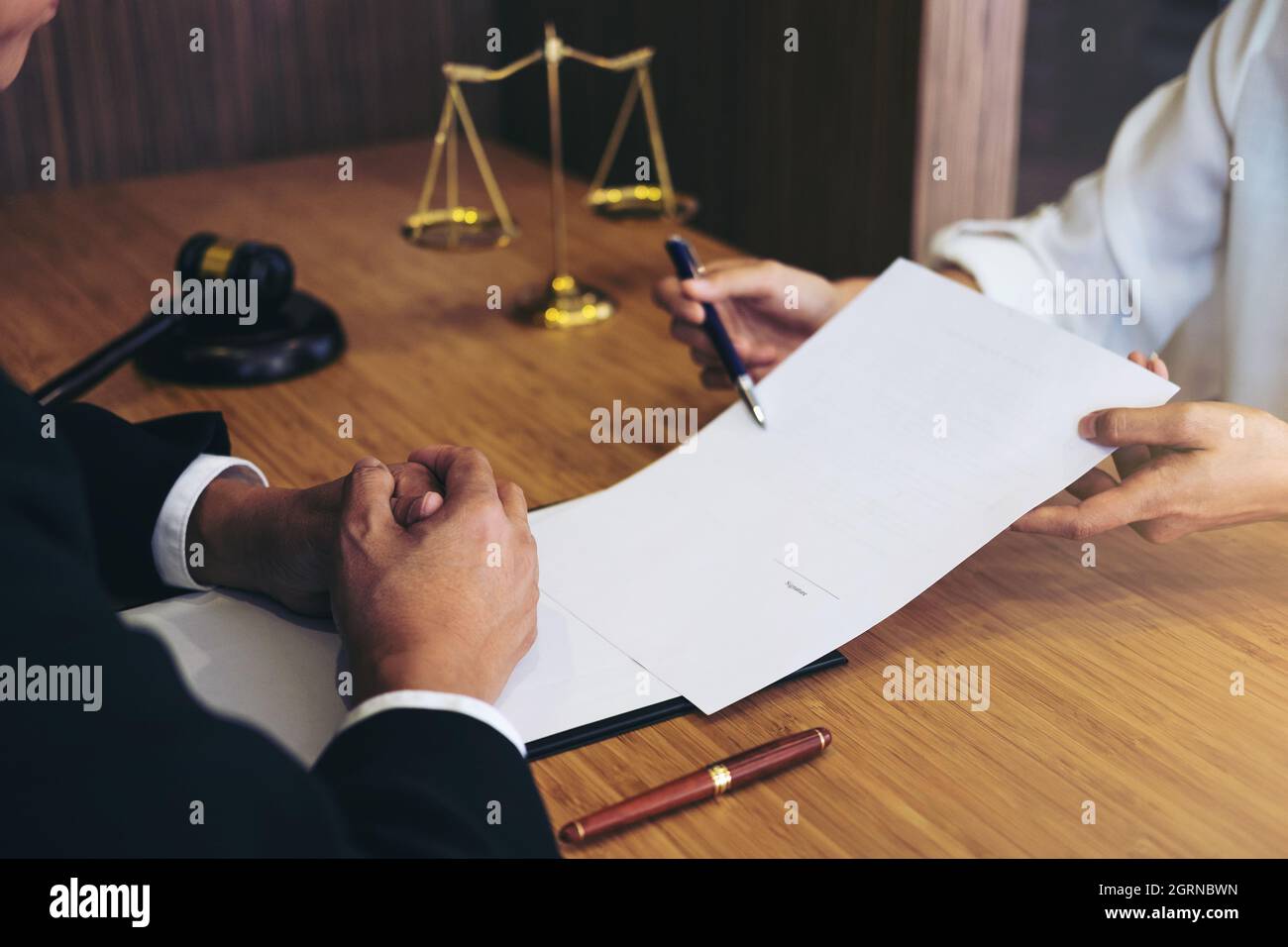 Asking for signature hi-res stock photography and images - Alamy