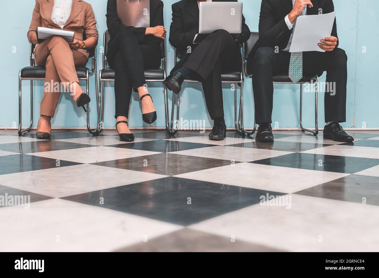 Four people waiting interview sitting hi-res stock photography and ...