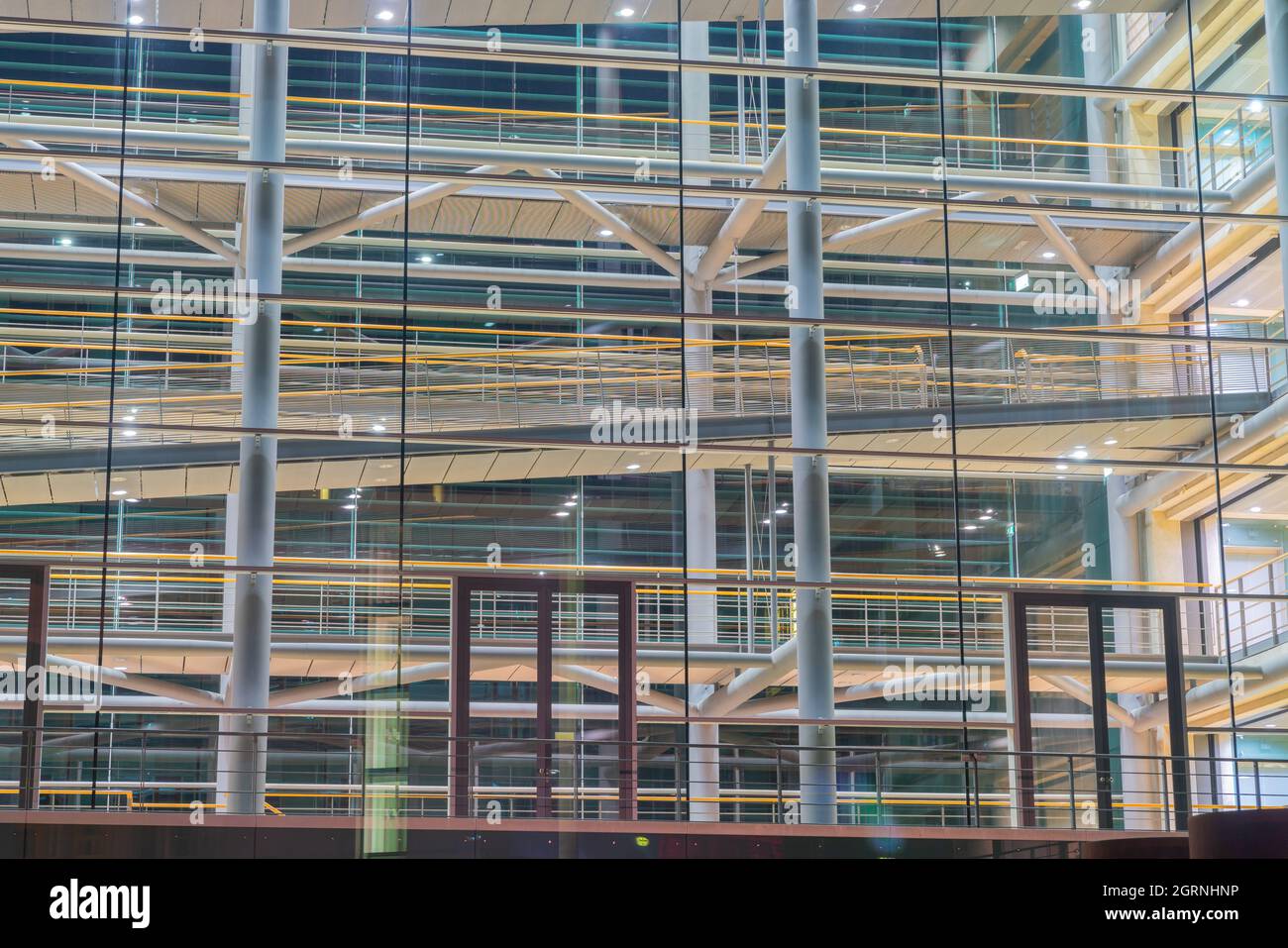 Steel structure glass walls and parking building ramps and levels ...