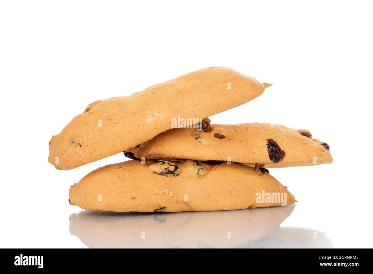 Three homemade shortbread cookies with raisins, close-up, isolated on ...