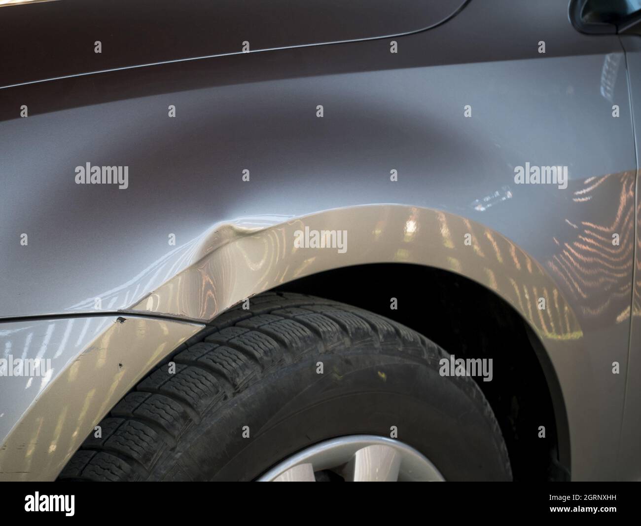Damaged car in the front left part of the vehicle Stock Photo - Alamy