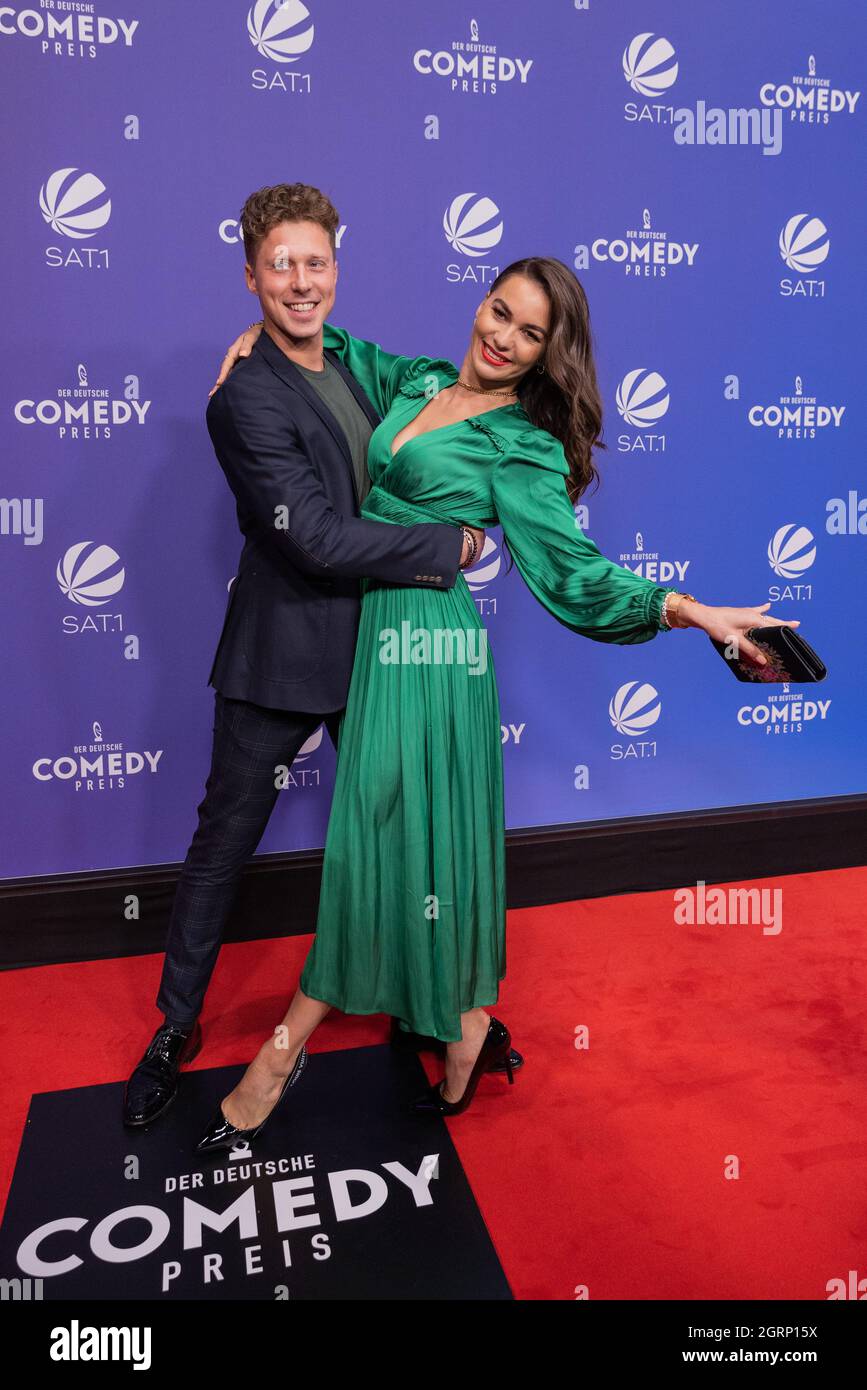 Cologne, Germany. 01st Oct, 2021. Renata and Valentin Lusin walk the ...