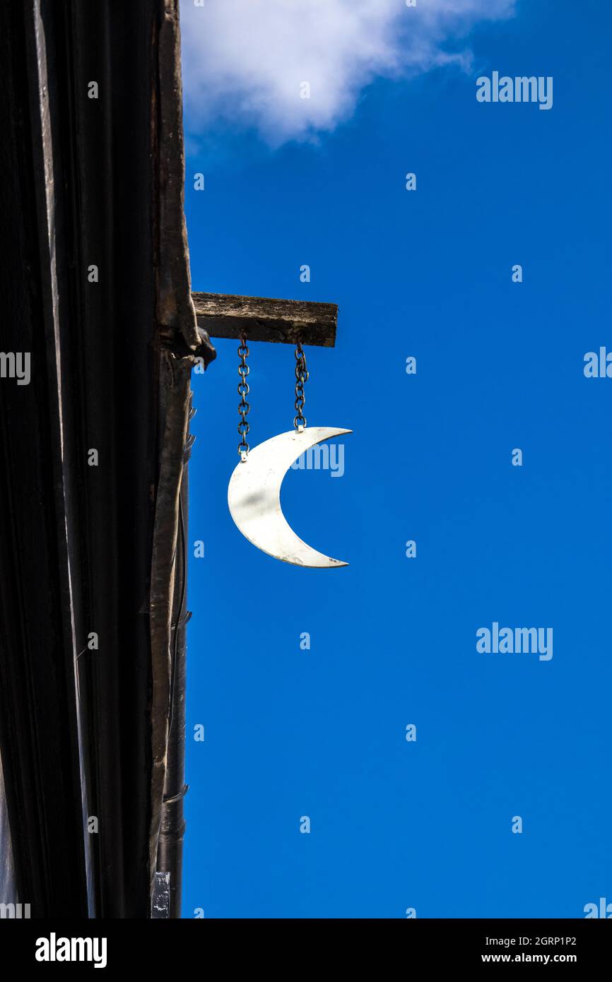 The old pub sign for the half moon pub in Little St Marys Lane in ...