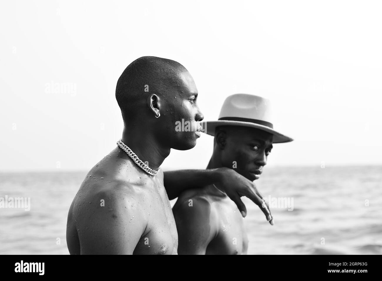 two boys swimming in the ocean Stock Photo - Alamy