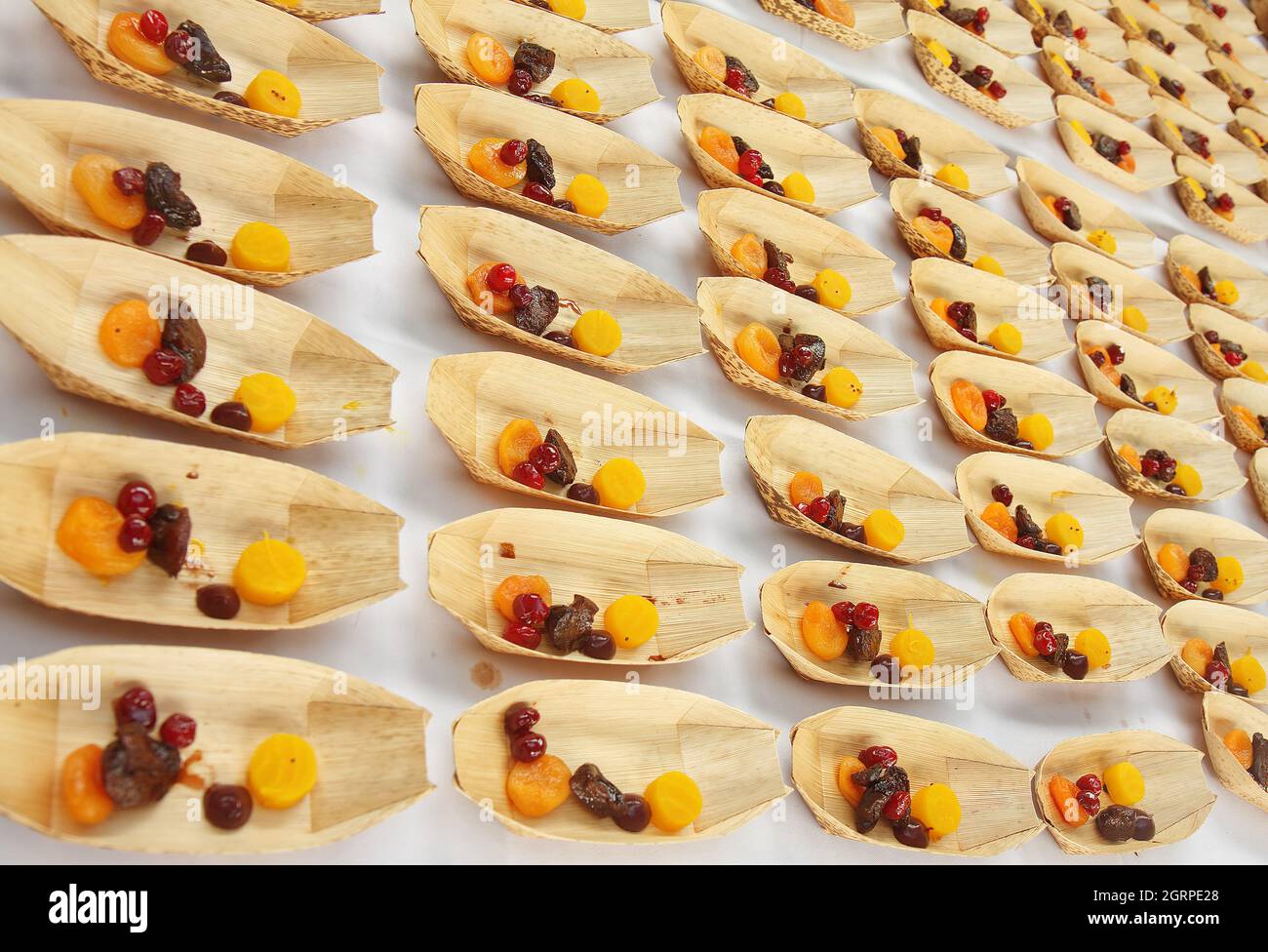 Cooking demonstration, table with food portions on display Stock Photo ...