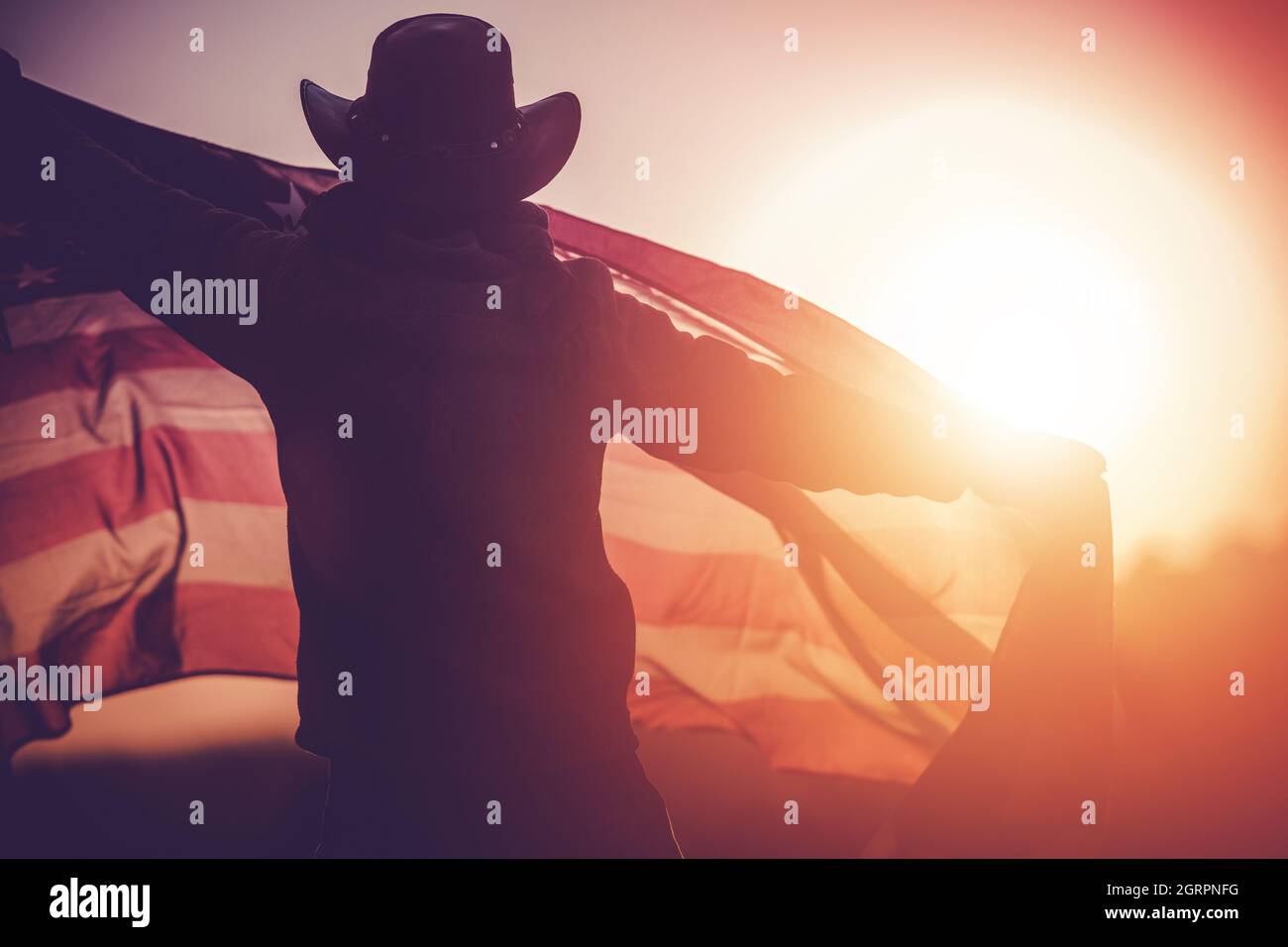 Back view of man with american flag hi-res stock photography and images ...