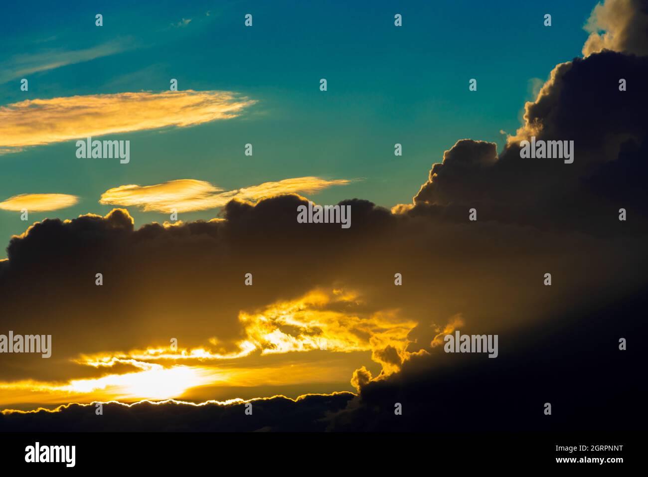 Beautiful bright sunset. Panoranic Sunrise Sky with colorful clouds Stock Photo - Alamy