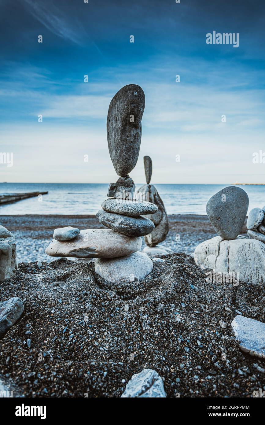 Stack of balanced stones on the beach Stock Photo - Alamy