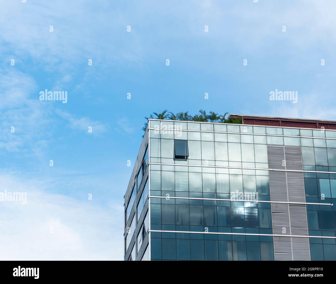 modern office building with tree and sky background Stock Photo - Alamy