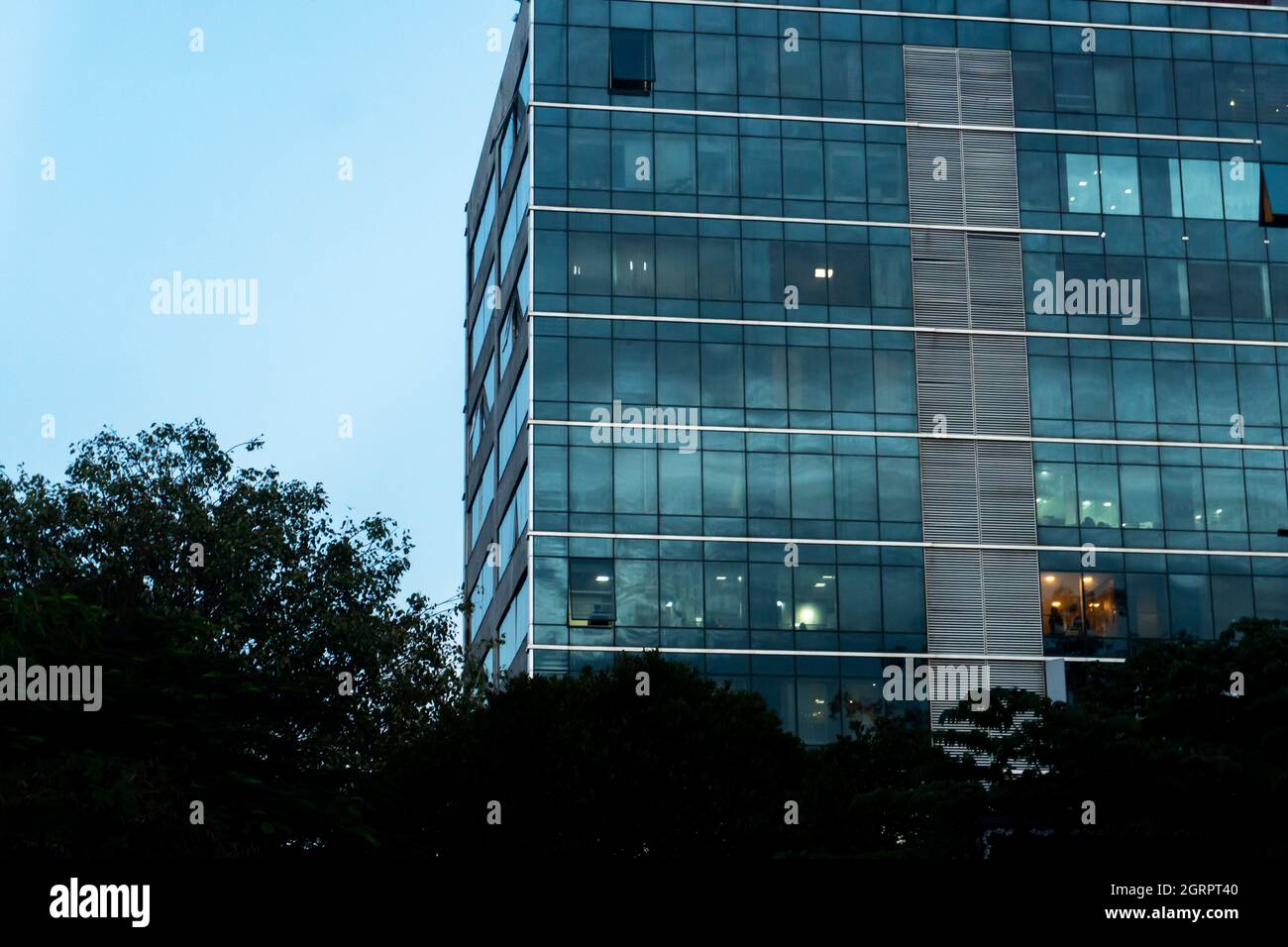 modern office building with tree and sky background Stock Photo - Alamy