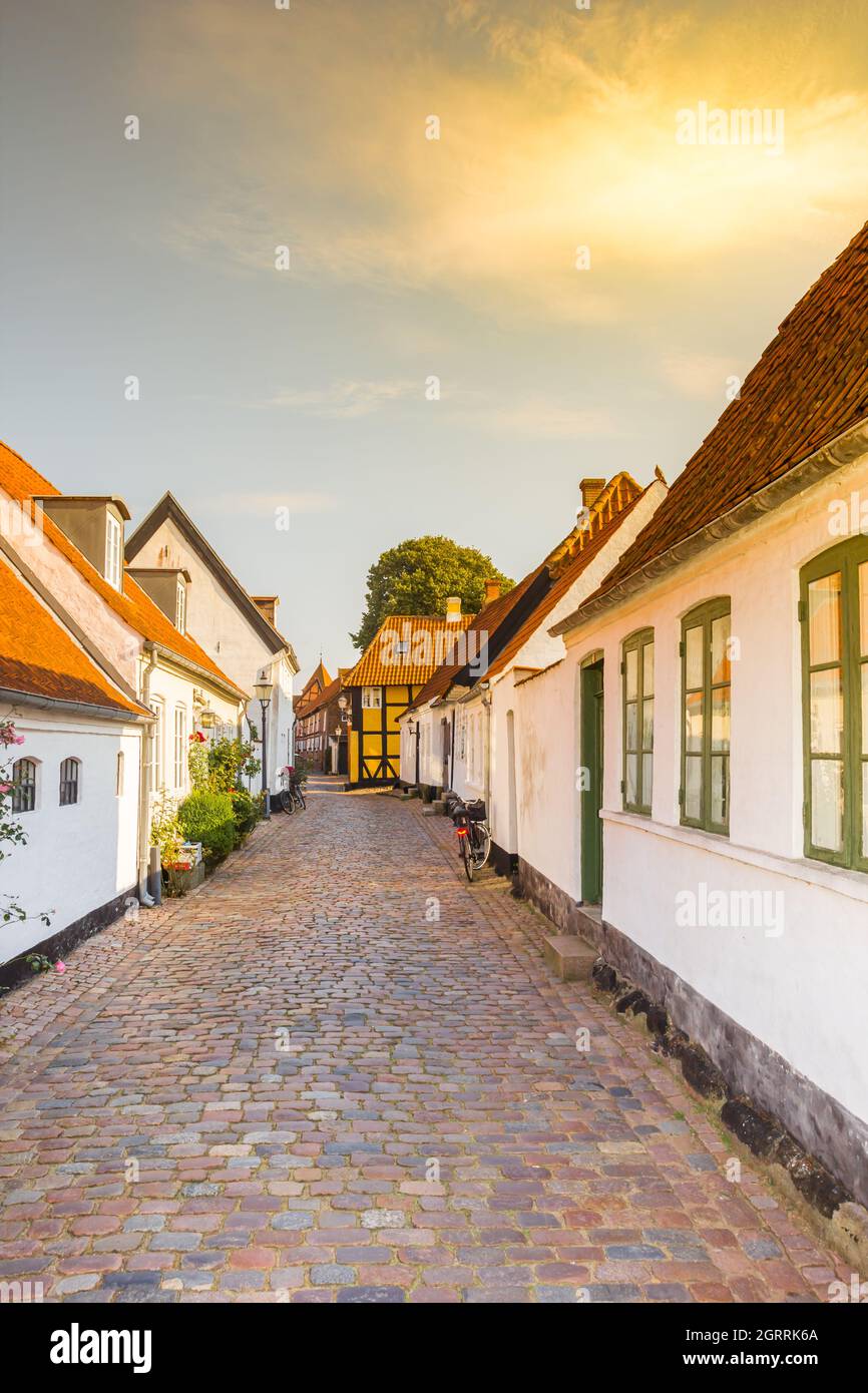 Sunset over a narrow historic street in Ribe, Denmark Stock Photo - Alamy