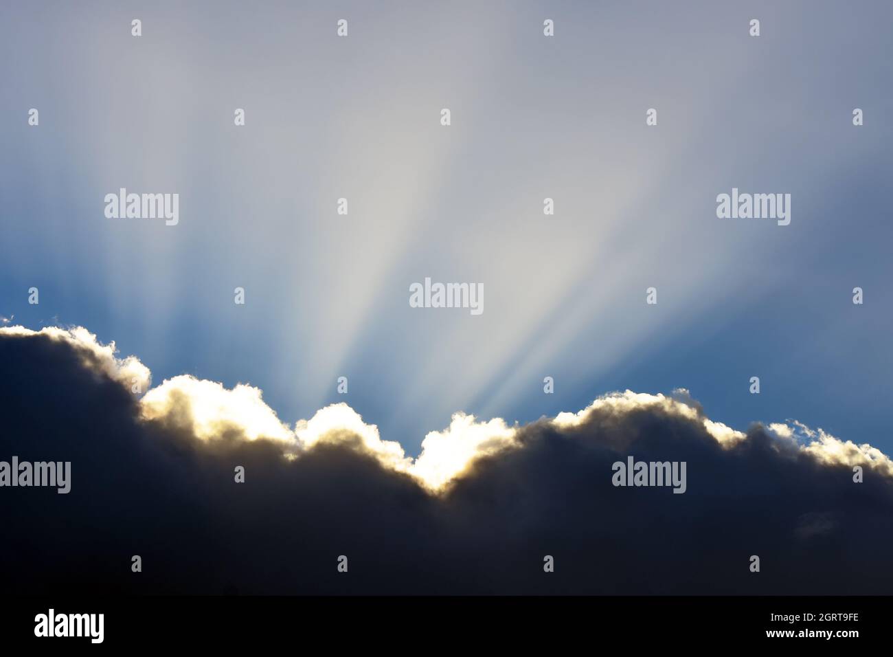 Clouds sun rays Stock Photo - Alamy