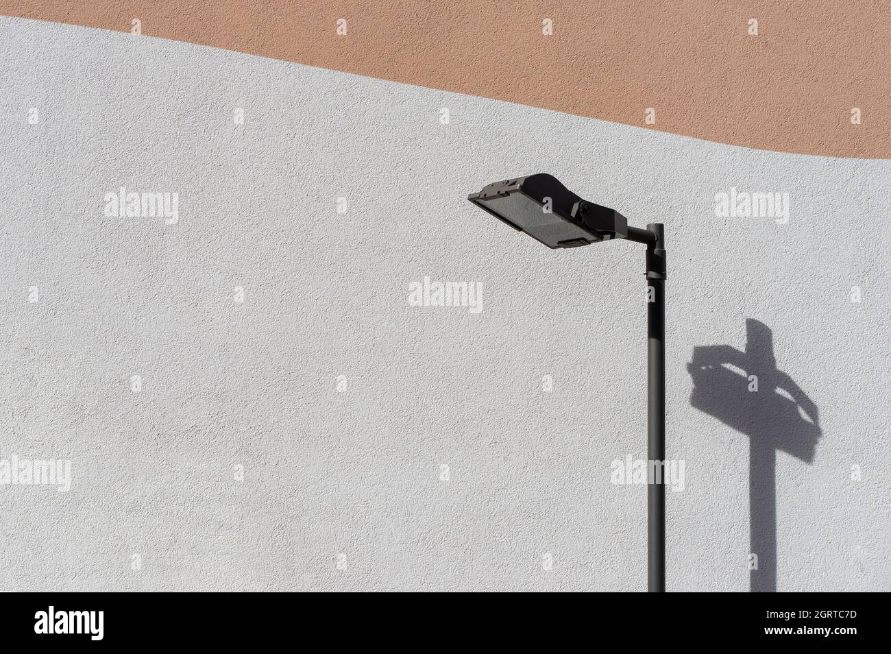 Shadow Of Street Lamp On Wall Stock Photo - Alamy