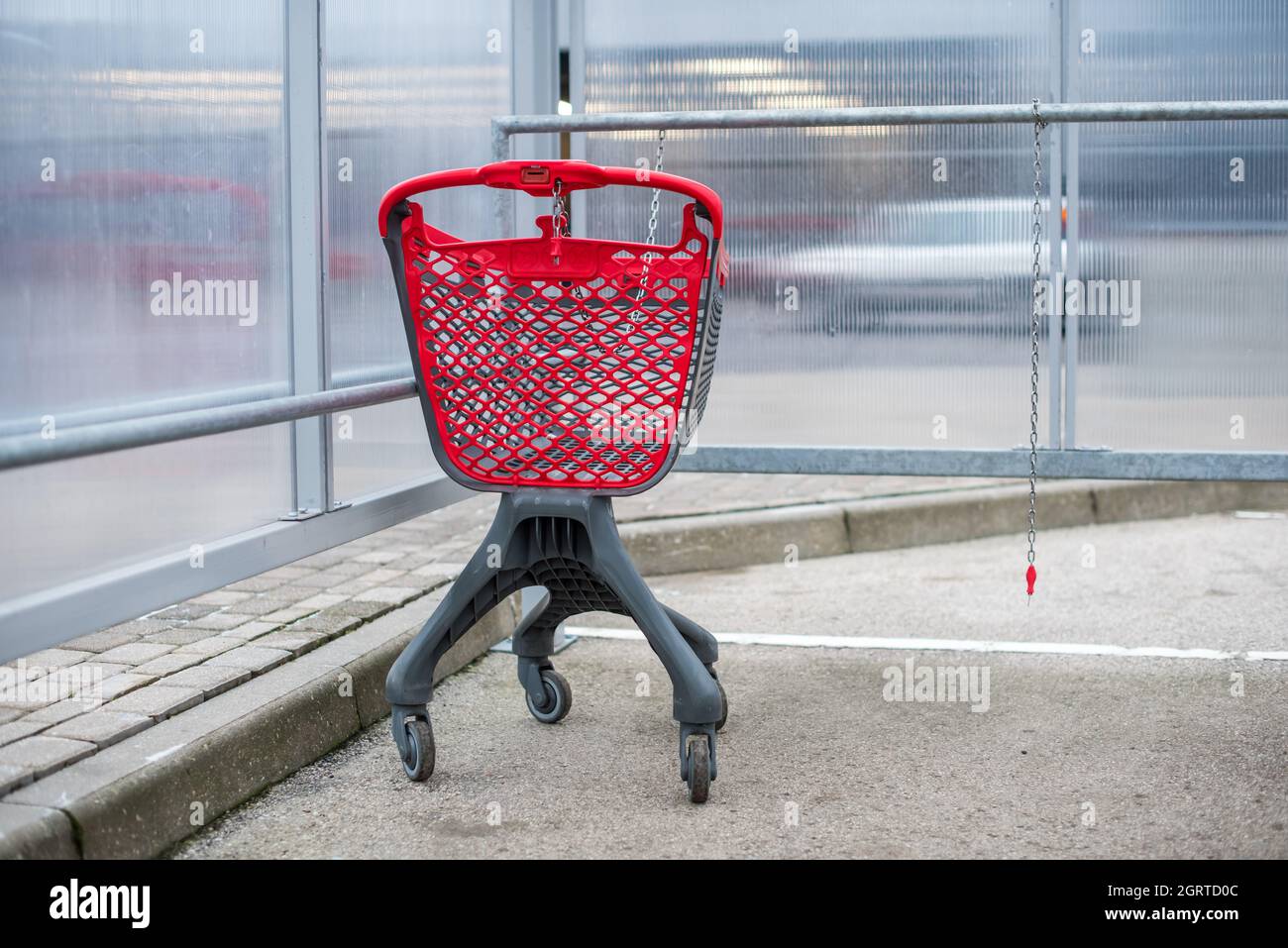 Supermarket shopping carts trolley with red accents Stock Photo - Alamy